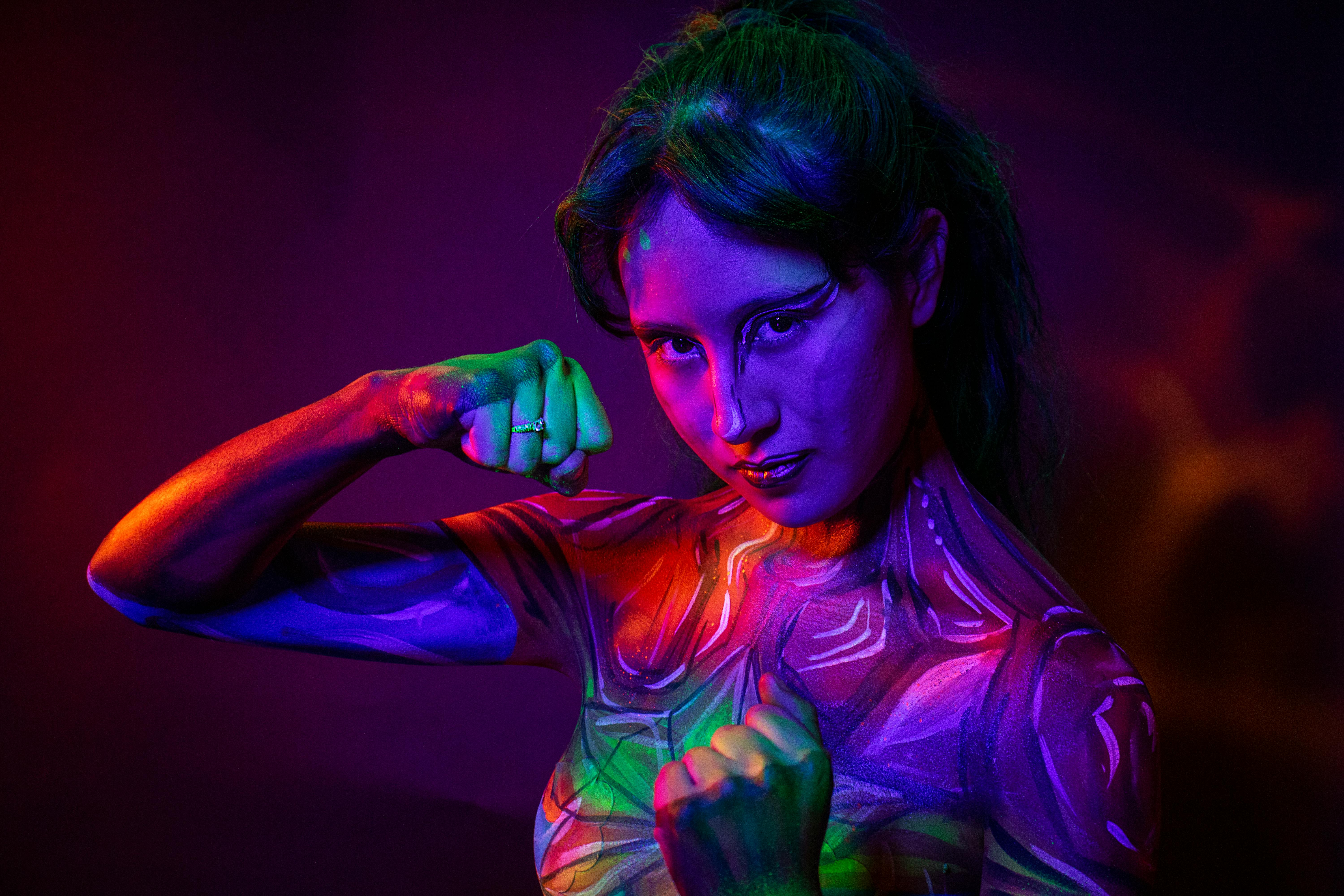 Vibrant Portrait of Woman with Neon Body Paint · Free Stock Photo