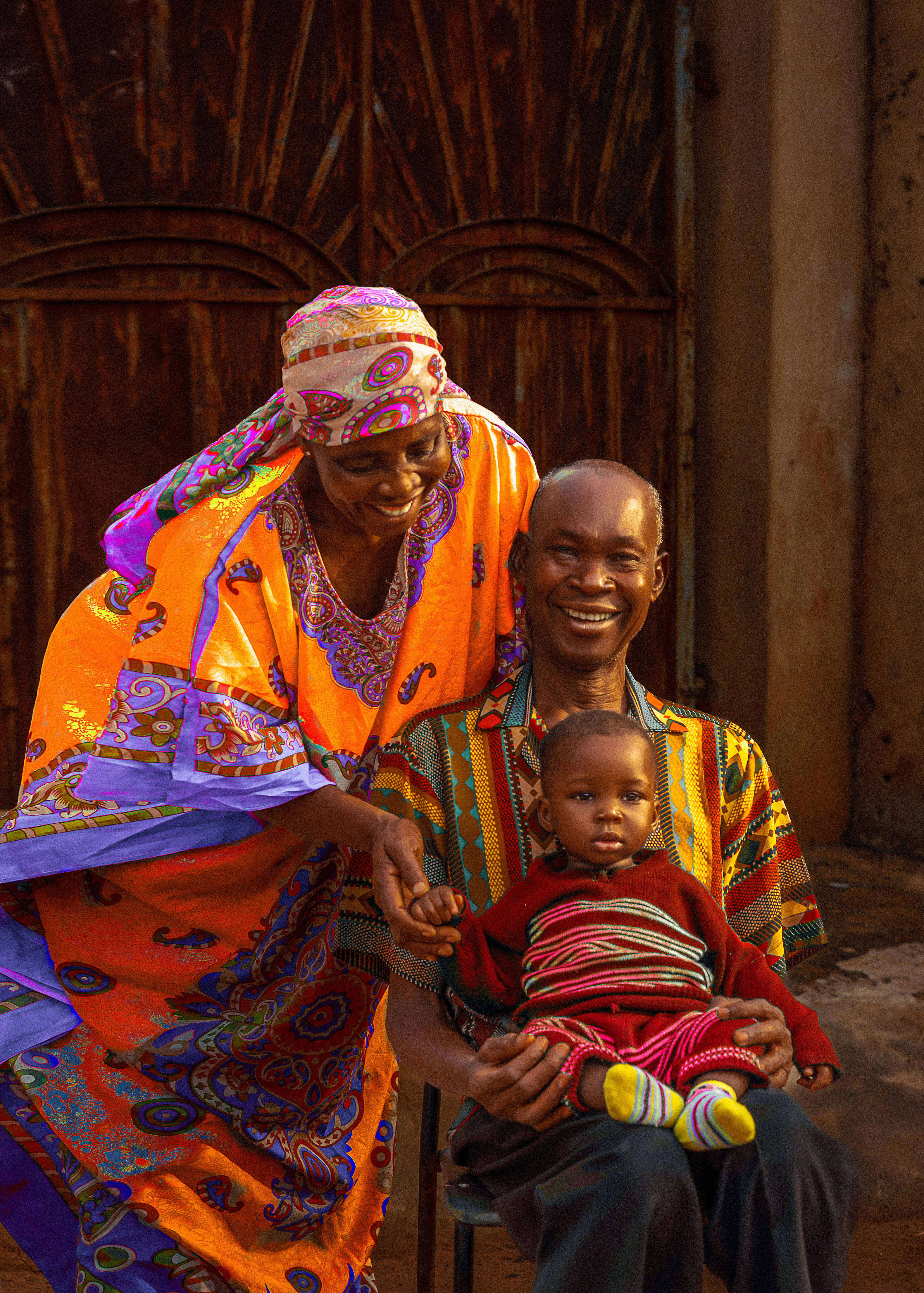 Happy African Family in Traditional Attire · Free Stock Photo