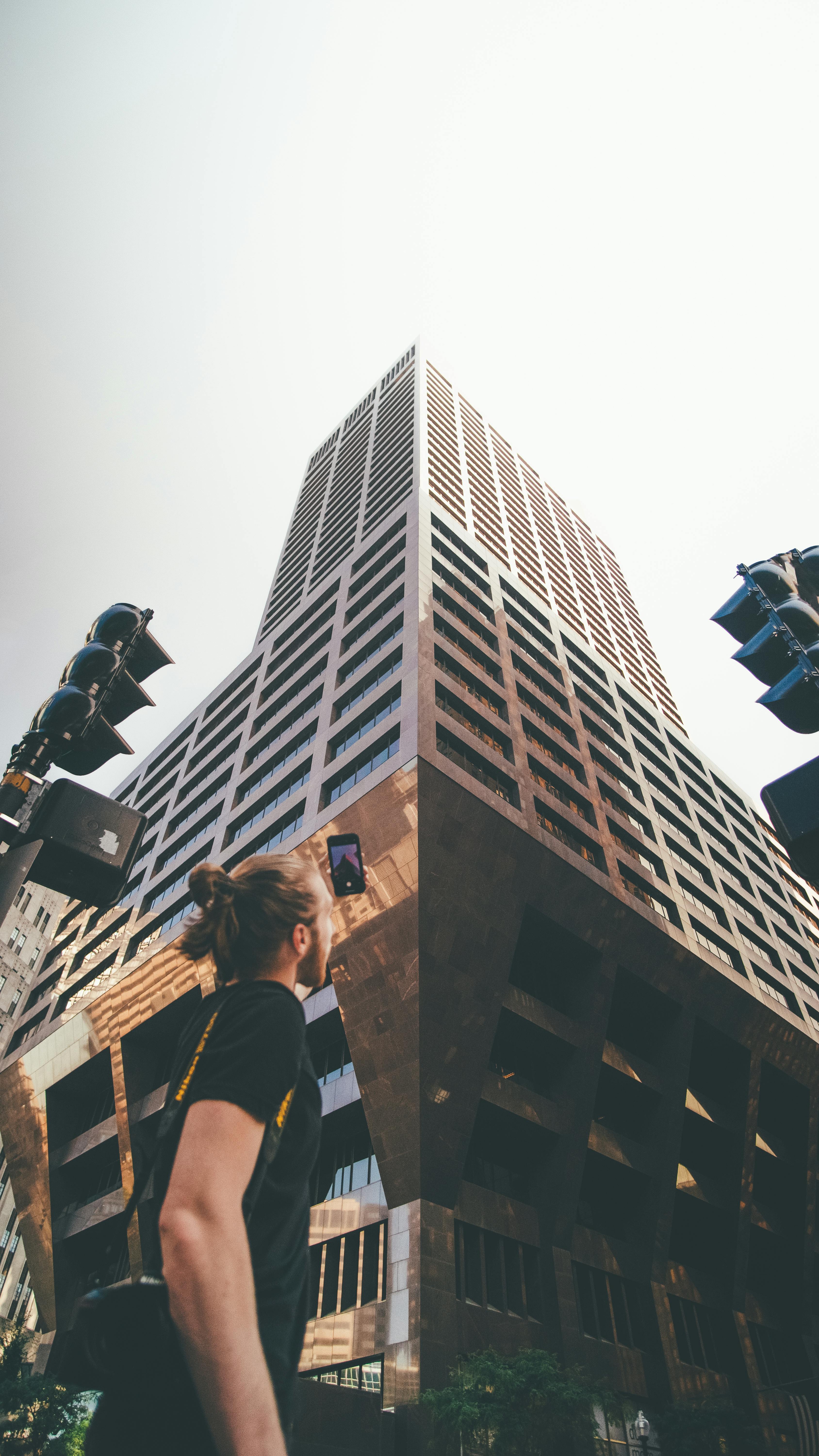 Person Looking At Building · Free Stock Photo