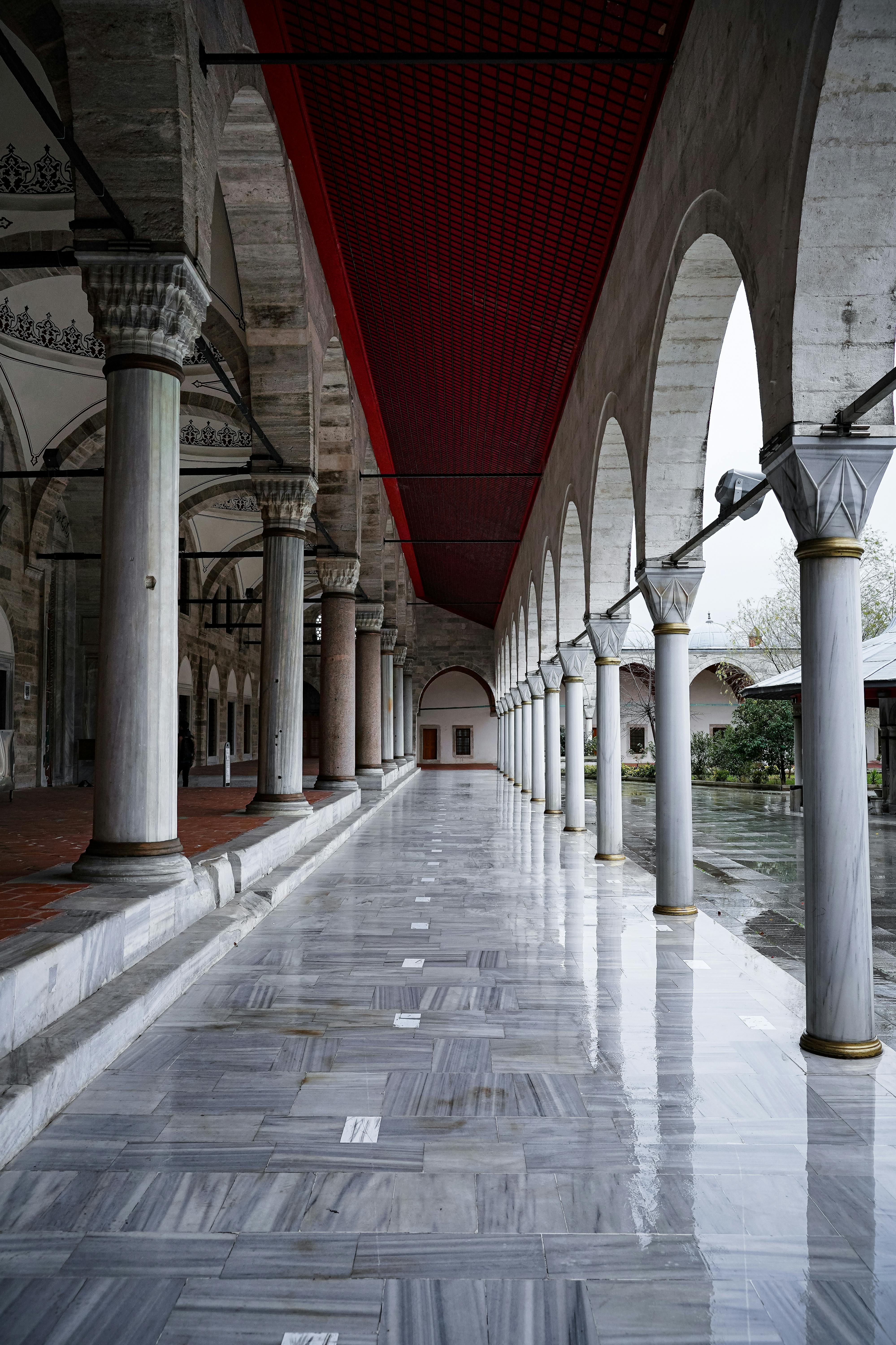 Elegant Arched Corridor with Marble Floor · Free Stock Photo