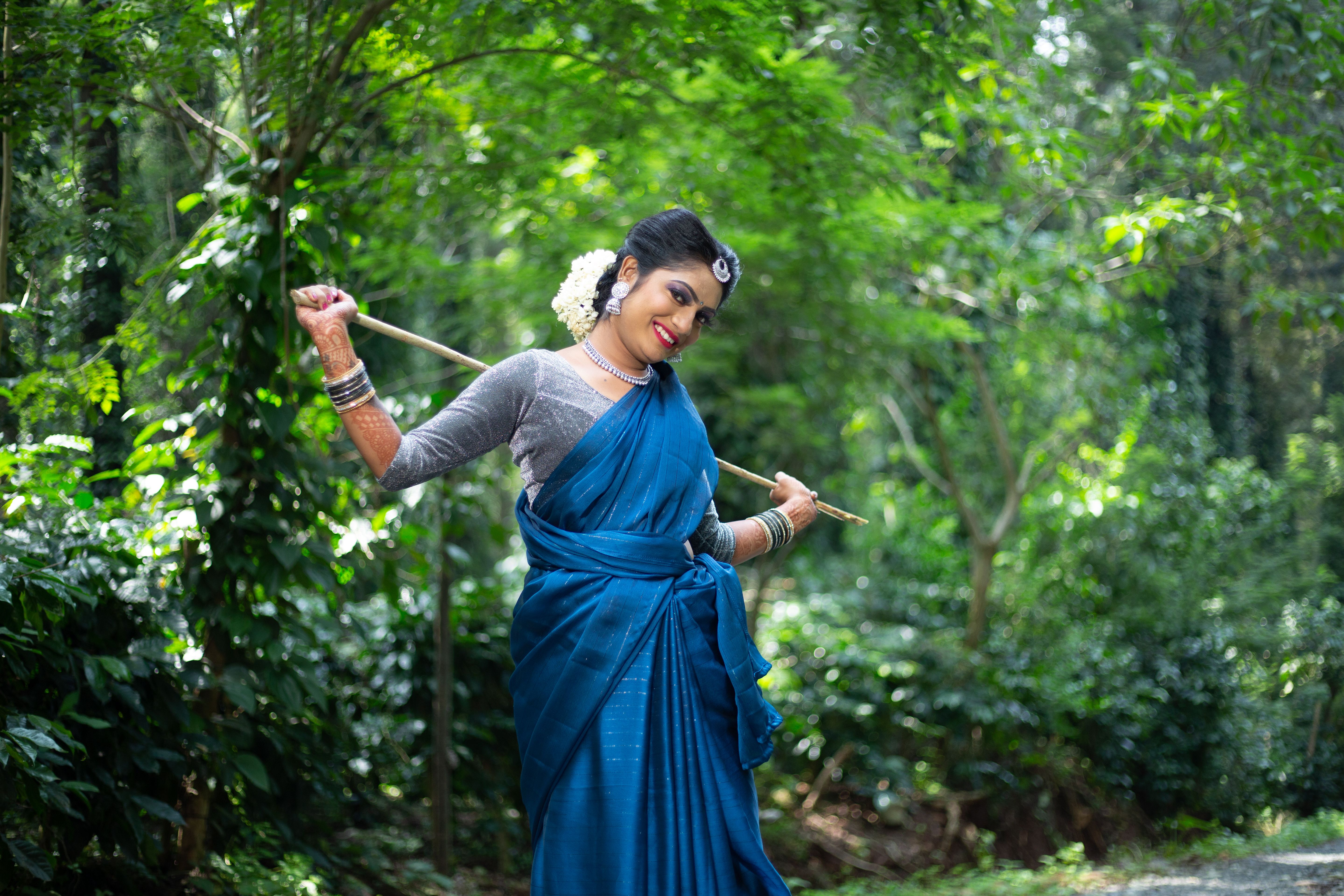 Smiling Woman in Blue Sari Outdoors · Free Stock Photo