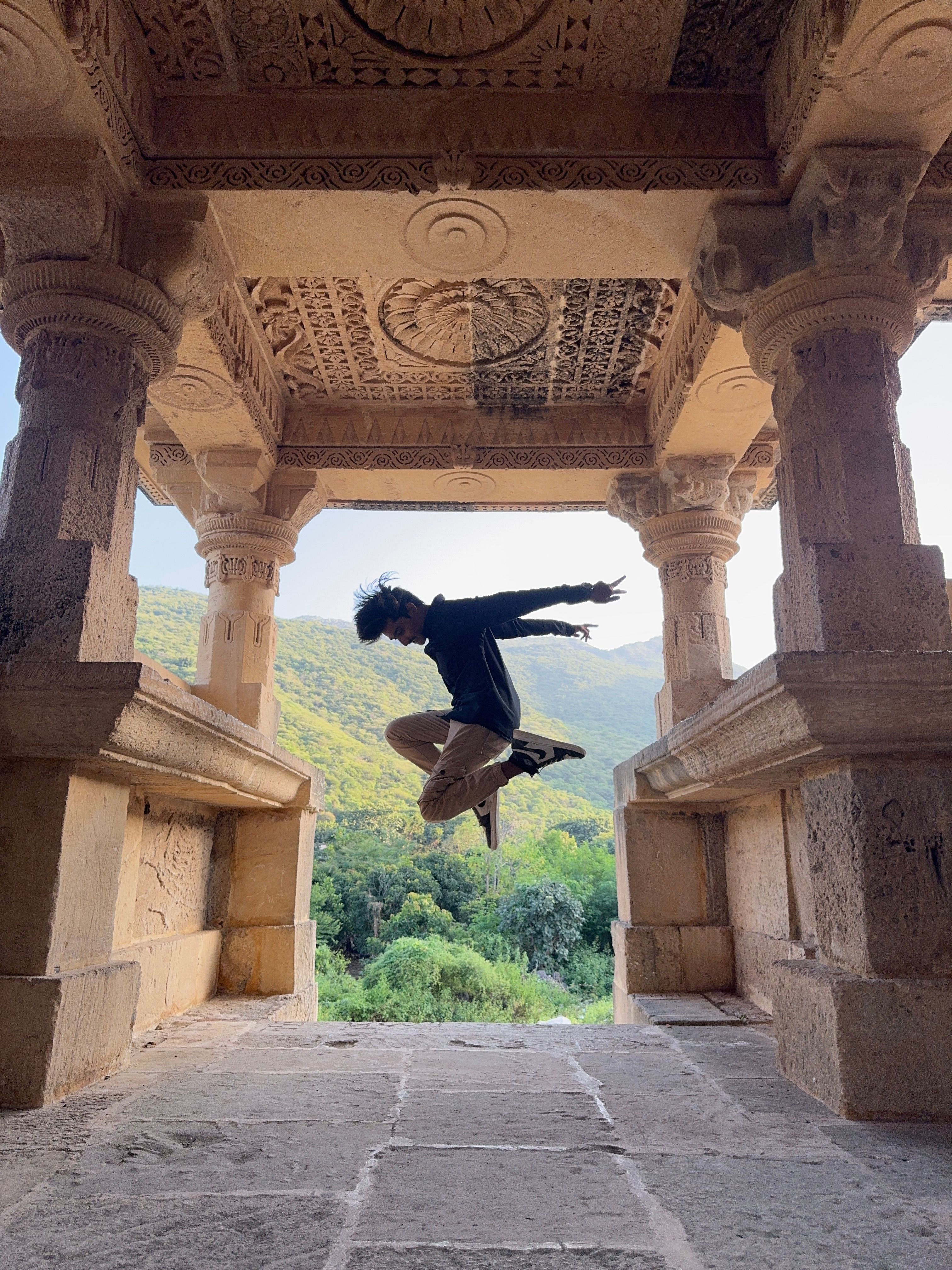 Dynamic Dance Pose in Historic Indian Architecture · Free Stock Photo