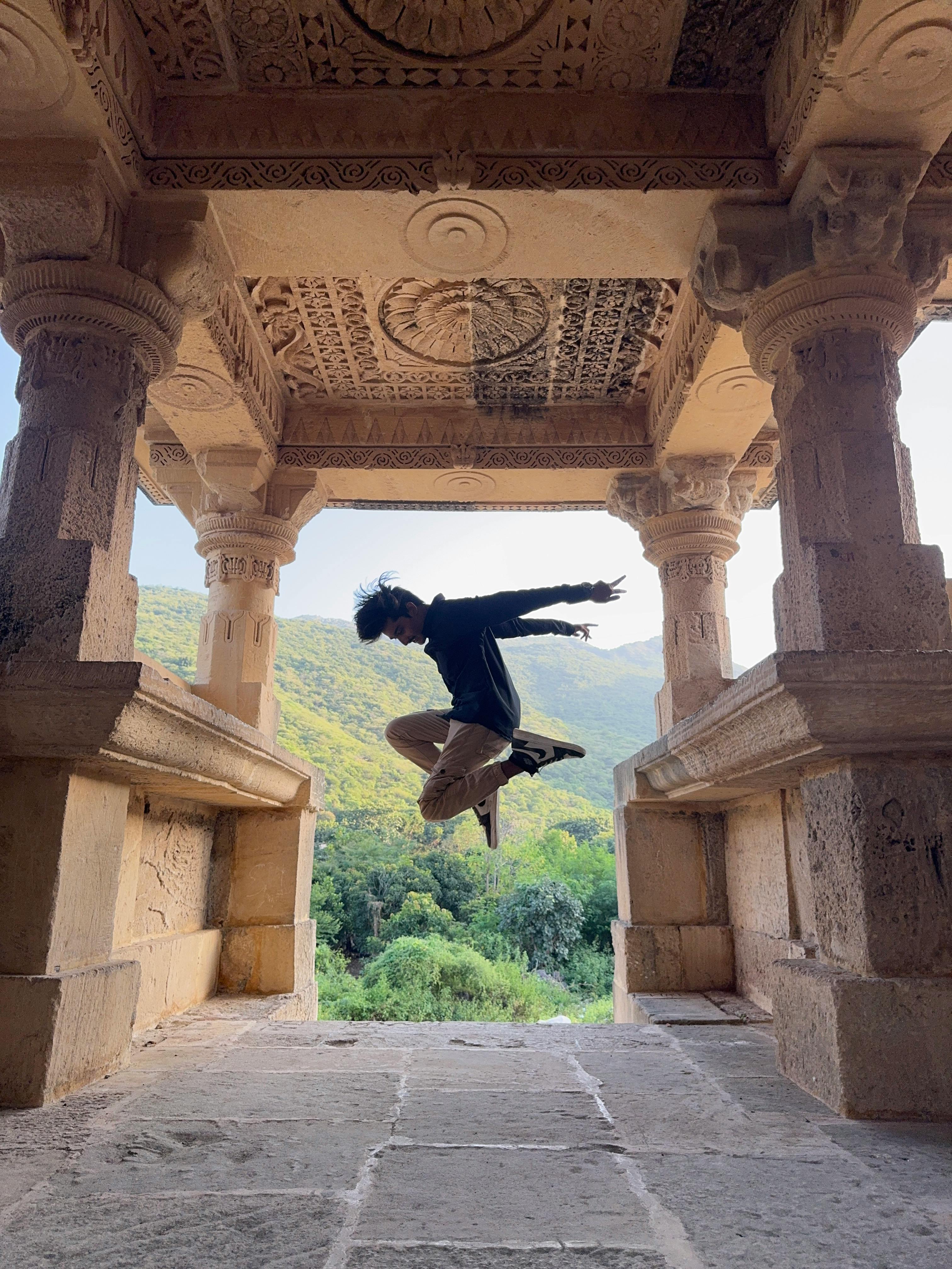 Dynamic Dance Pose in Historic Indian Architecture · Free Stock Photo