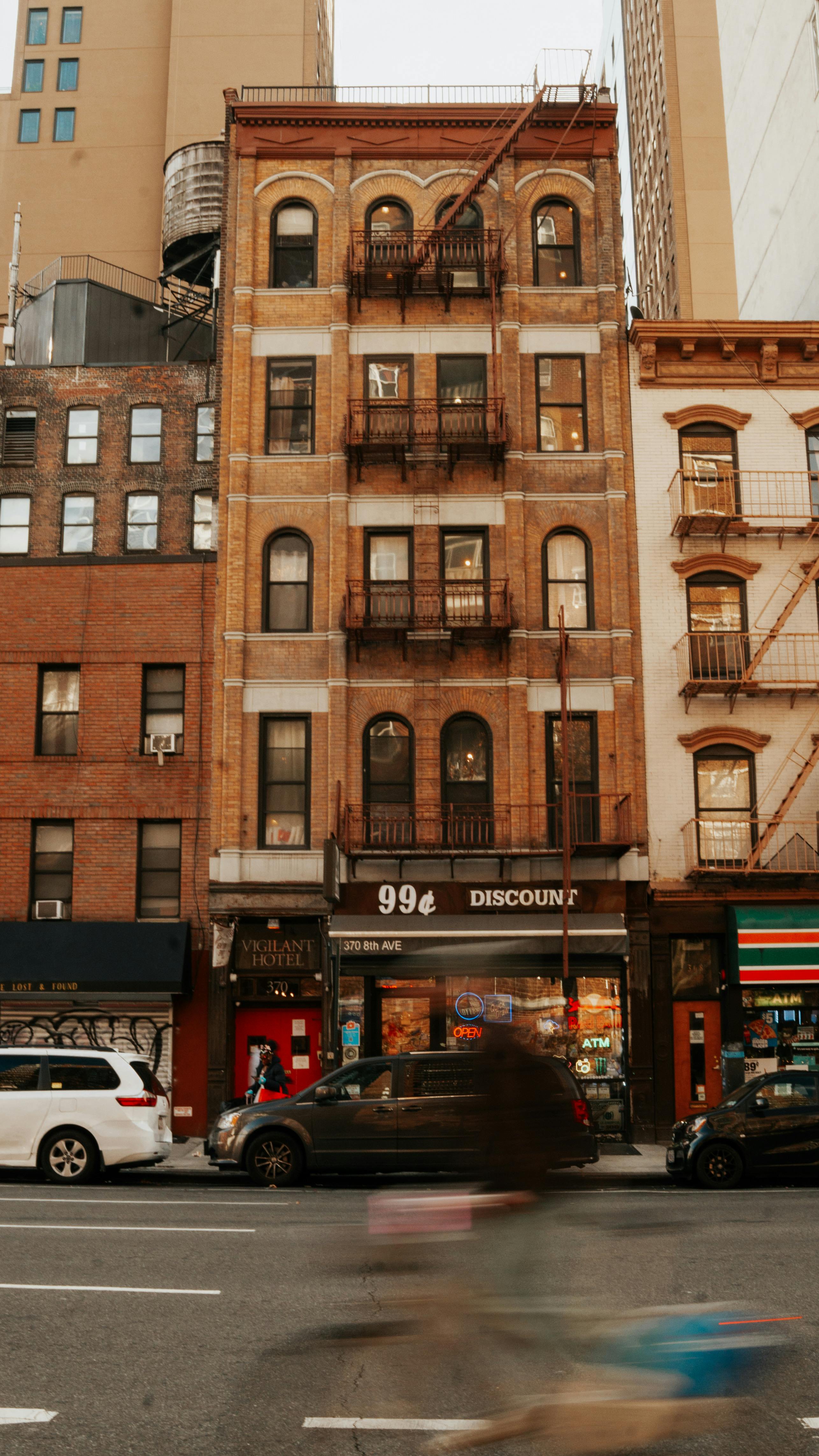 Urban Street Scene with Historic Building Fronts · Free Stock Photo