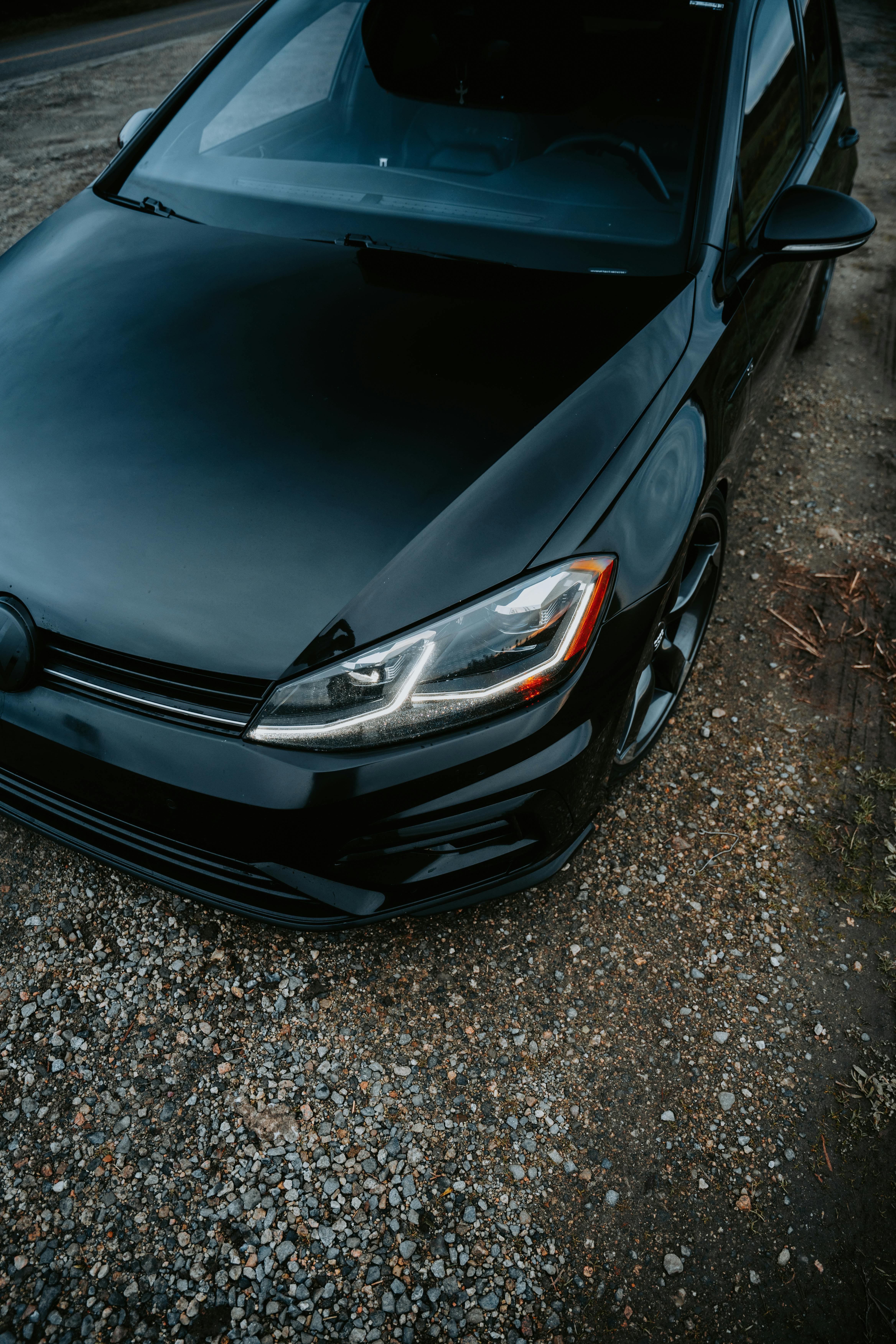 Sleek Black Ford Mustang in Urban Setting · Free Stock Photo