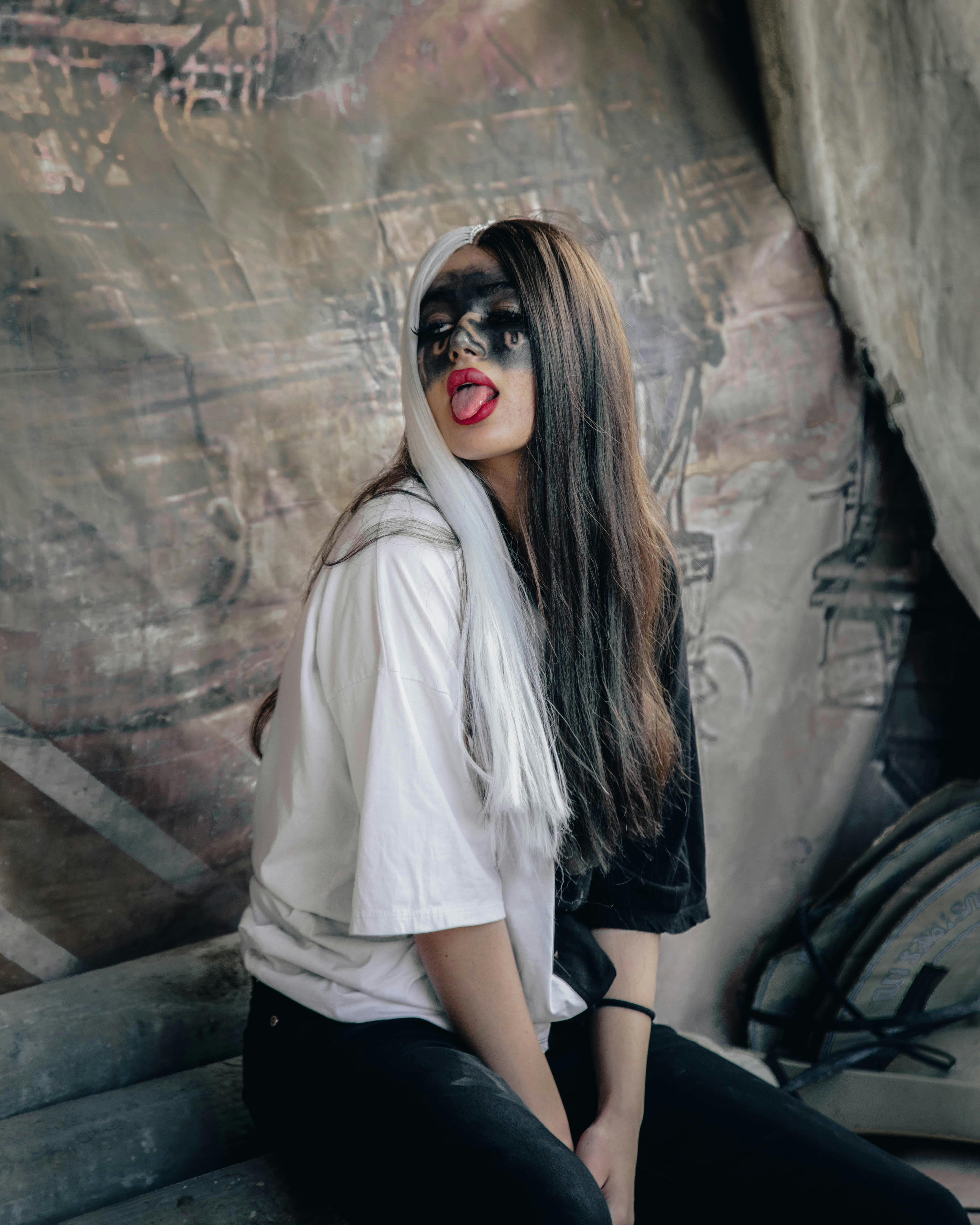 Edgy Portrait of Young Woman With Face Paint · Free Stock Photo