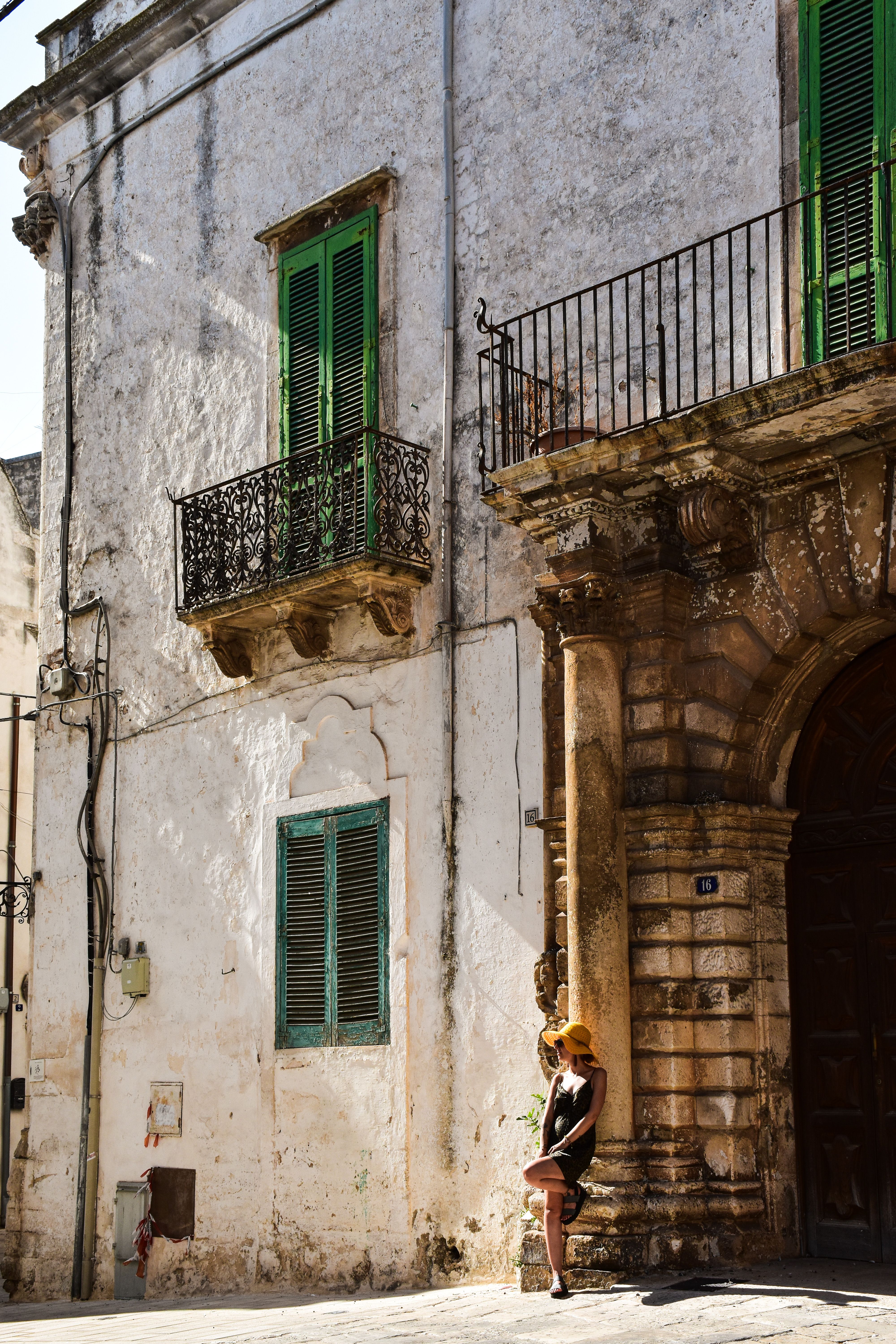 Historic Apulian Architecture with Woman in Sunlight · Free Stock Photo