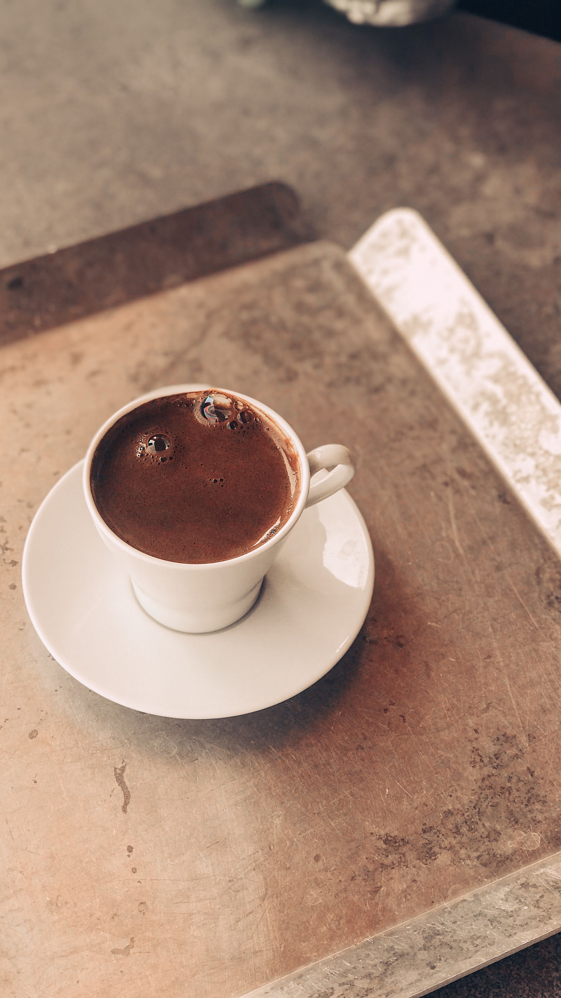 Artistic Overhead Shot of a Coffee Cup · Free Stock Photo