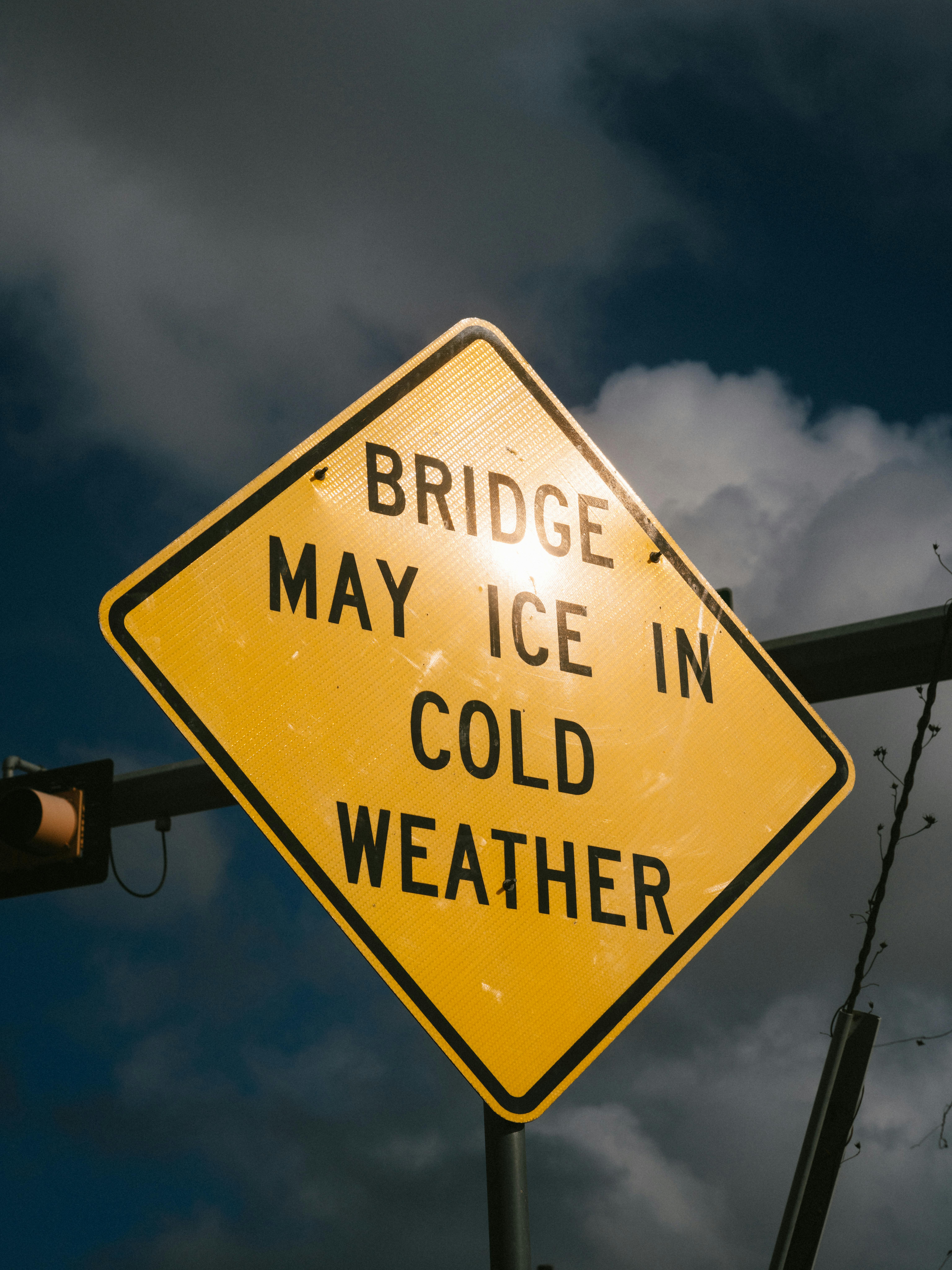 Weather Warning on Bridge: Ice Alert Sign · Free Stock Photo