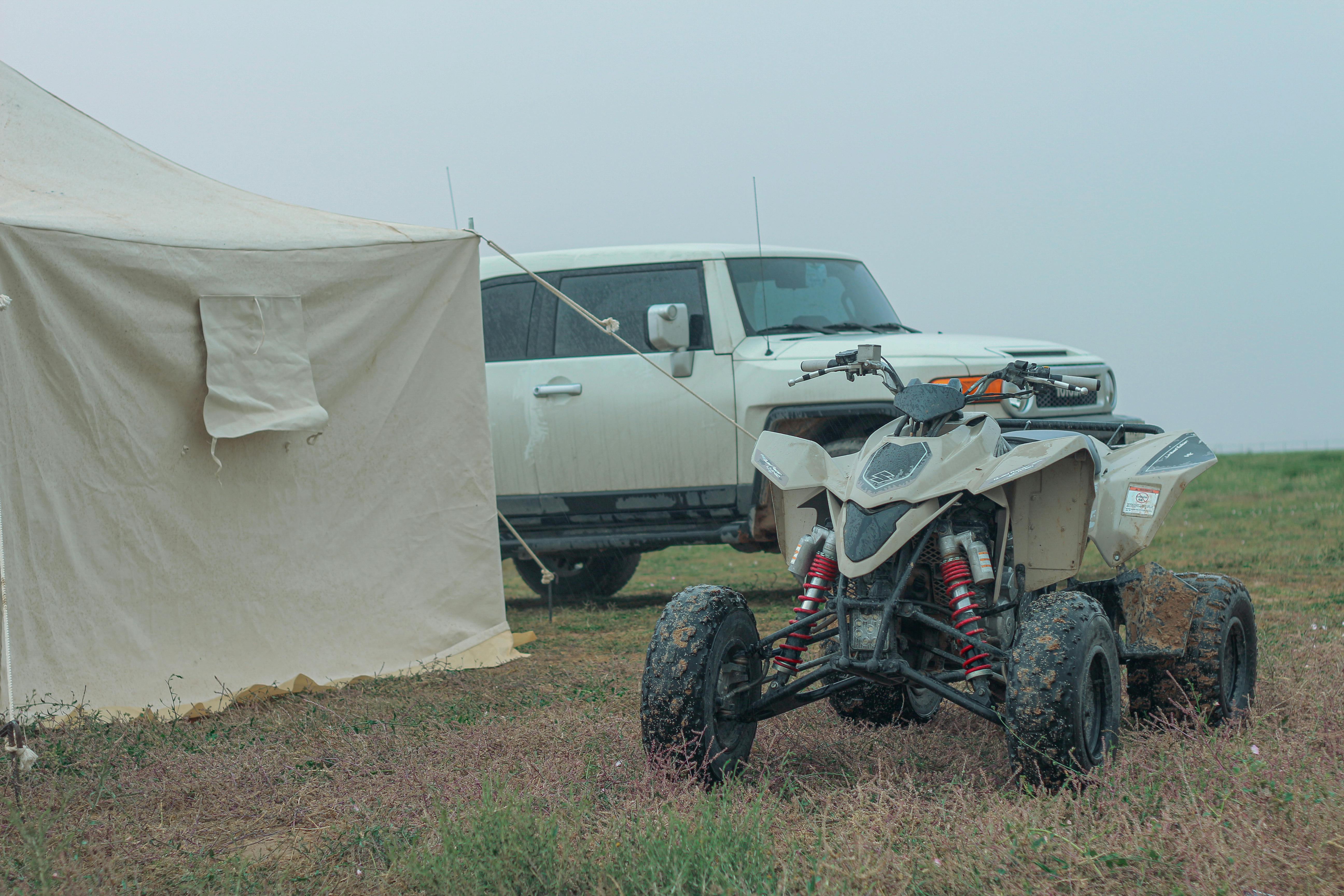 Desert Adventure Camp with Off-Road Vehicle and Tent · Free Stock Photo