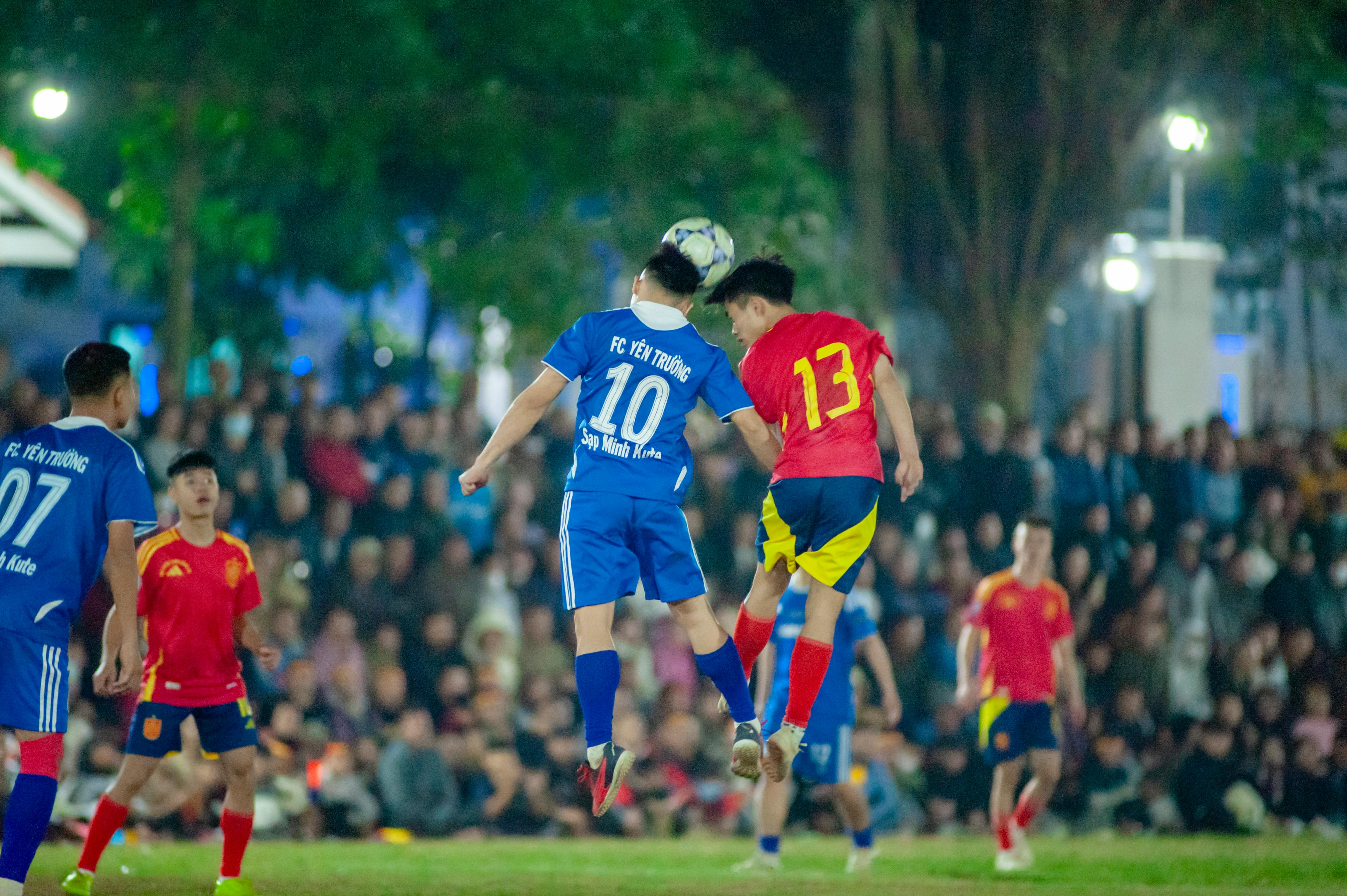 Vibrant Night Football Match in Hanoi · Free Stock Photo