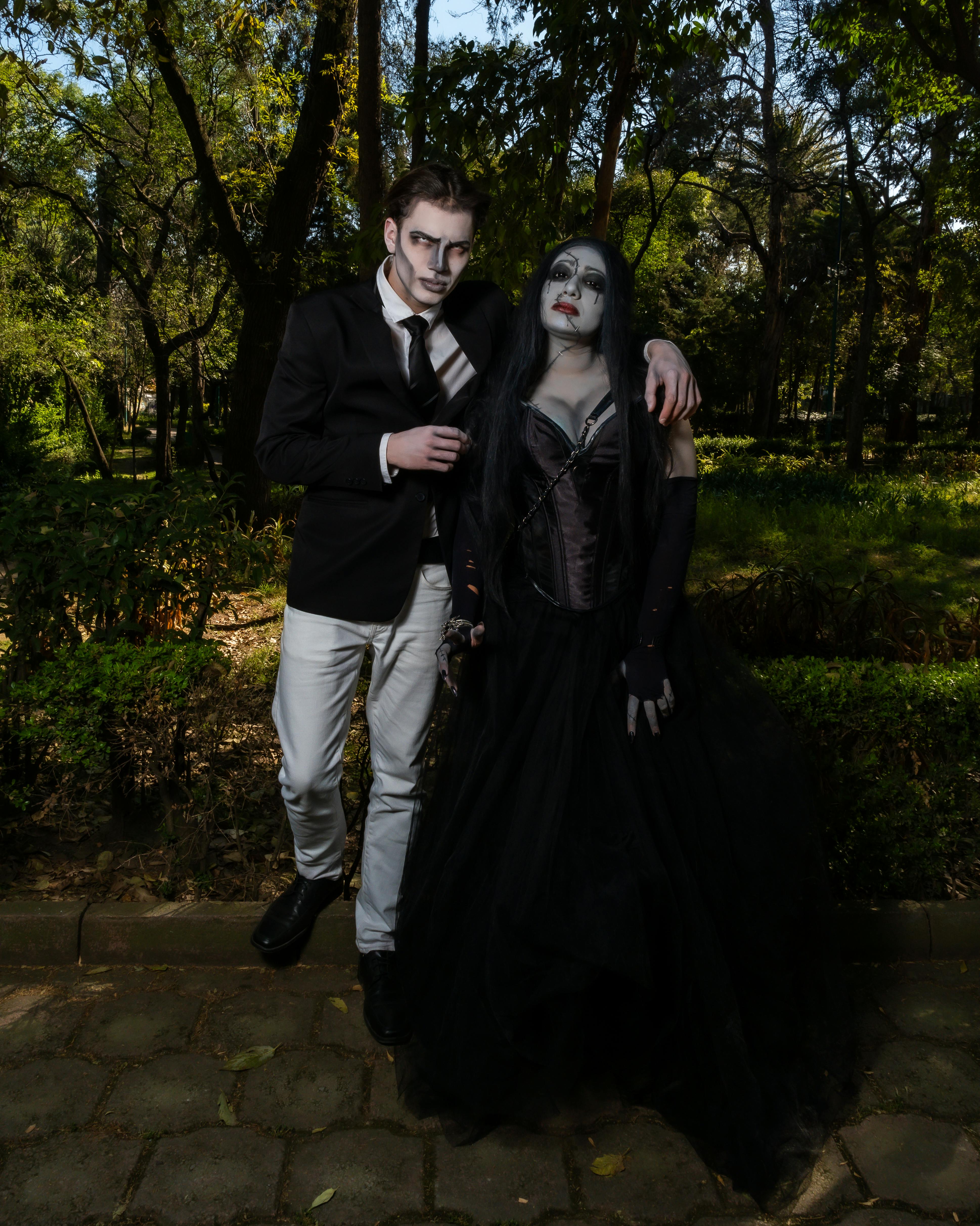 Gothic Cosplay Couple in Forest Setting · Free Stock Photo