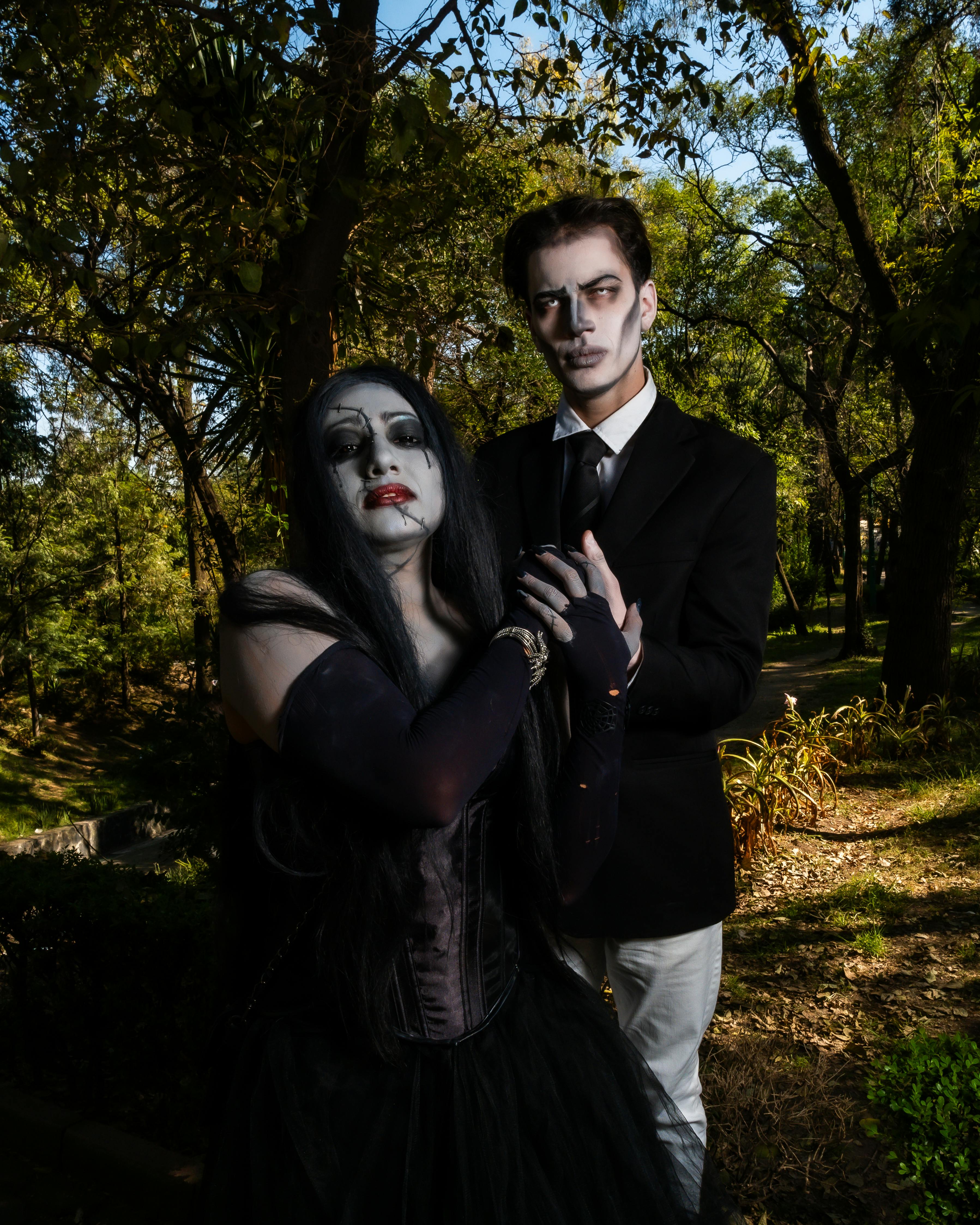 Dramatic Gothic Couple in Forest Setting · Free Stock Photo