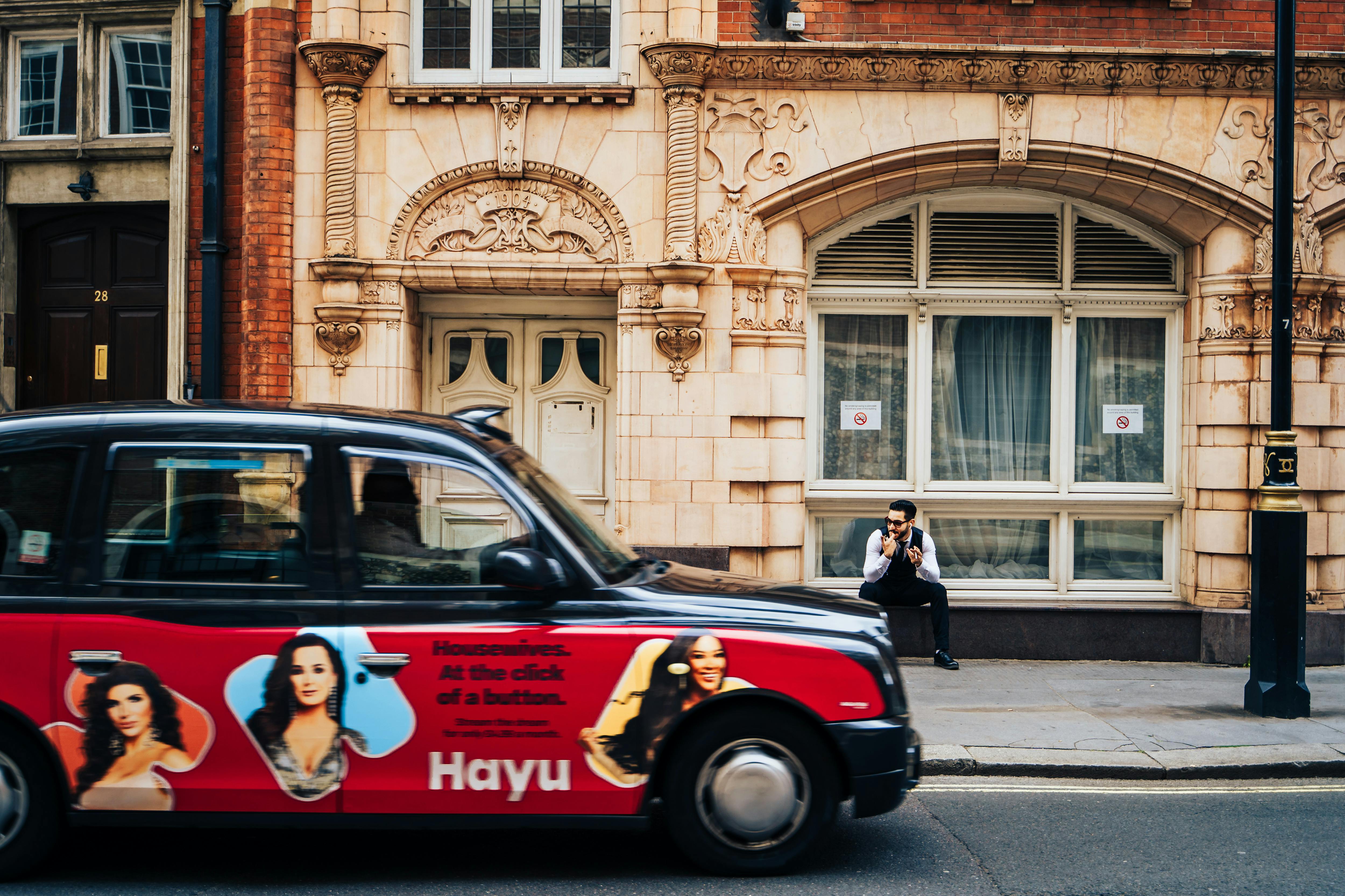 Bustling London Street with Iconic Black Cab · Free Stock Photo