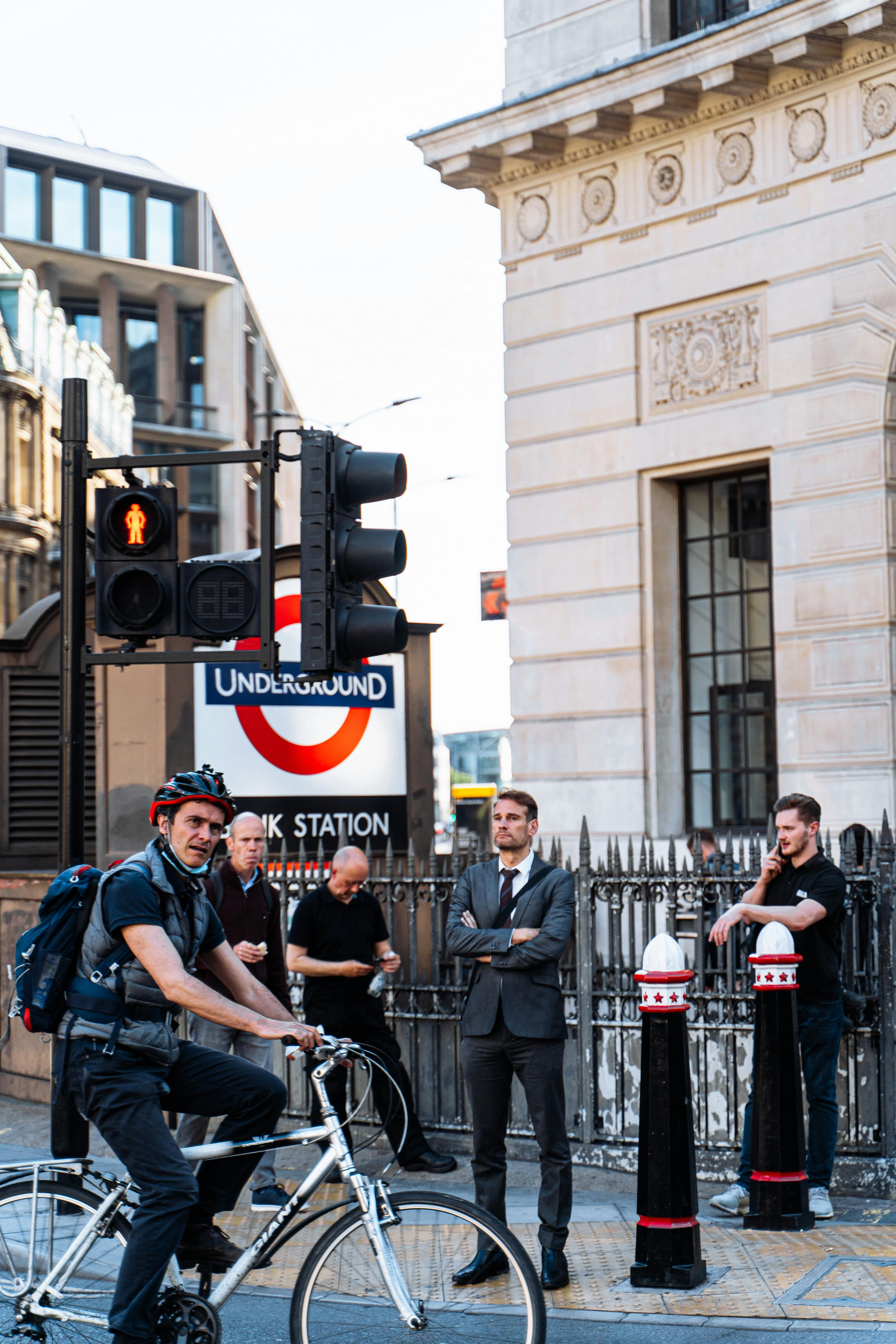 Busy London Street Scene Near Underground Sign · Free Stock Photo