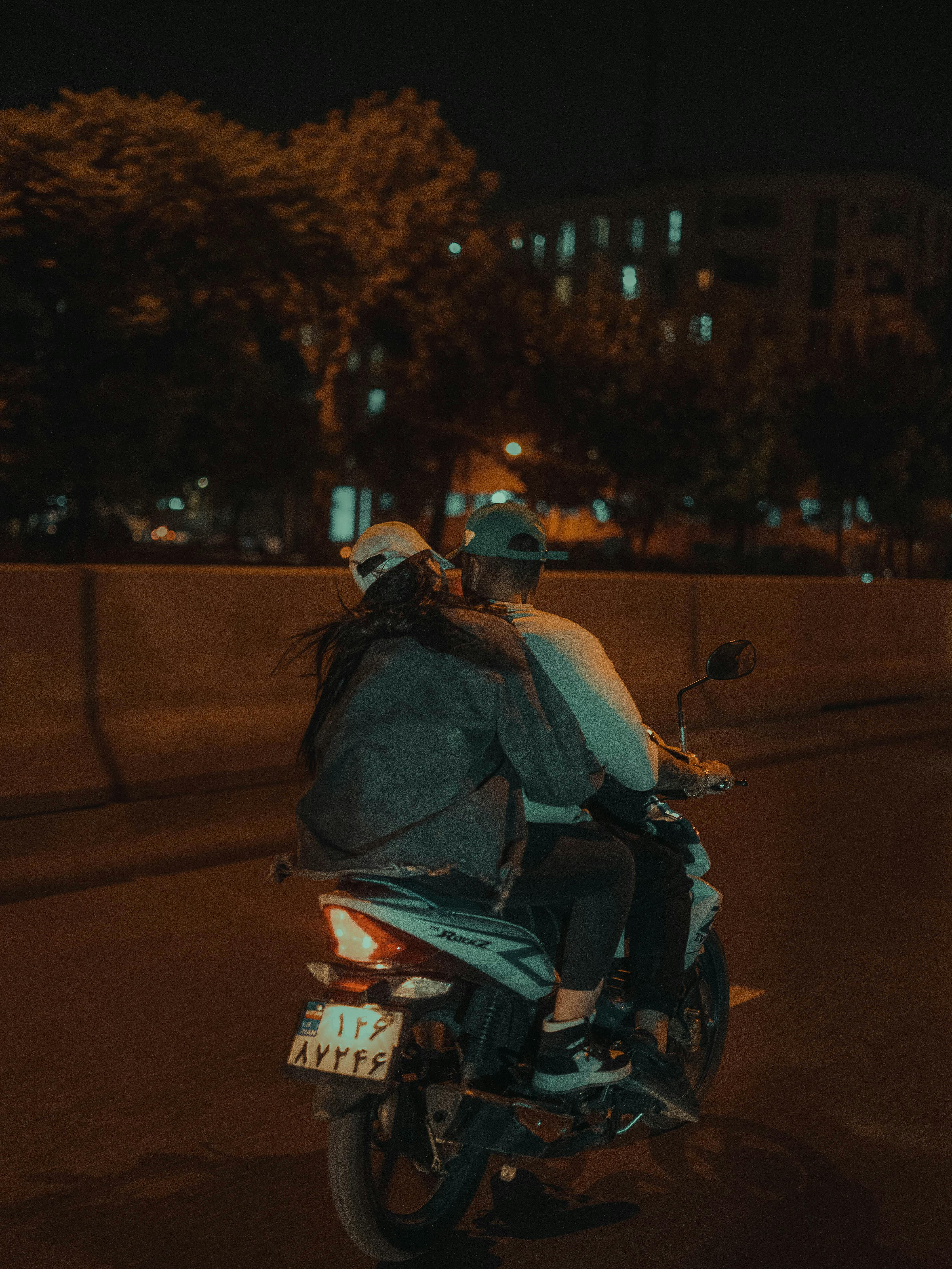 Night Motorcycle Ride Through the City Streets · Free Stock Photo