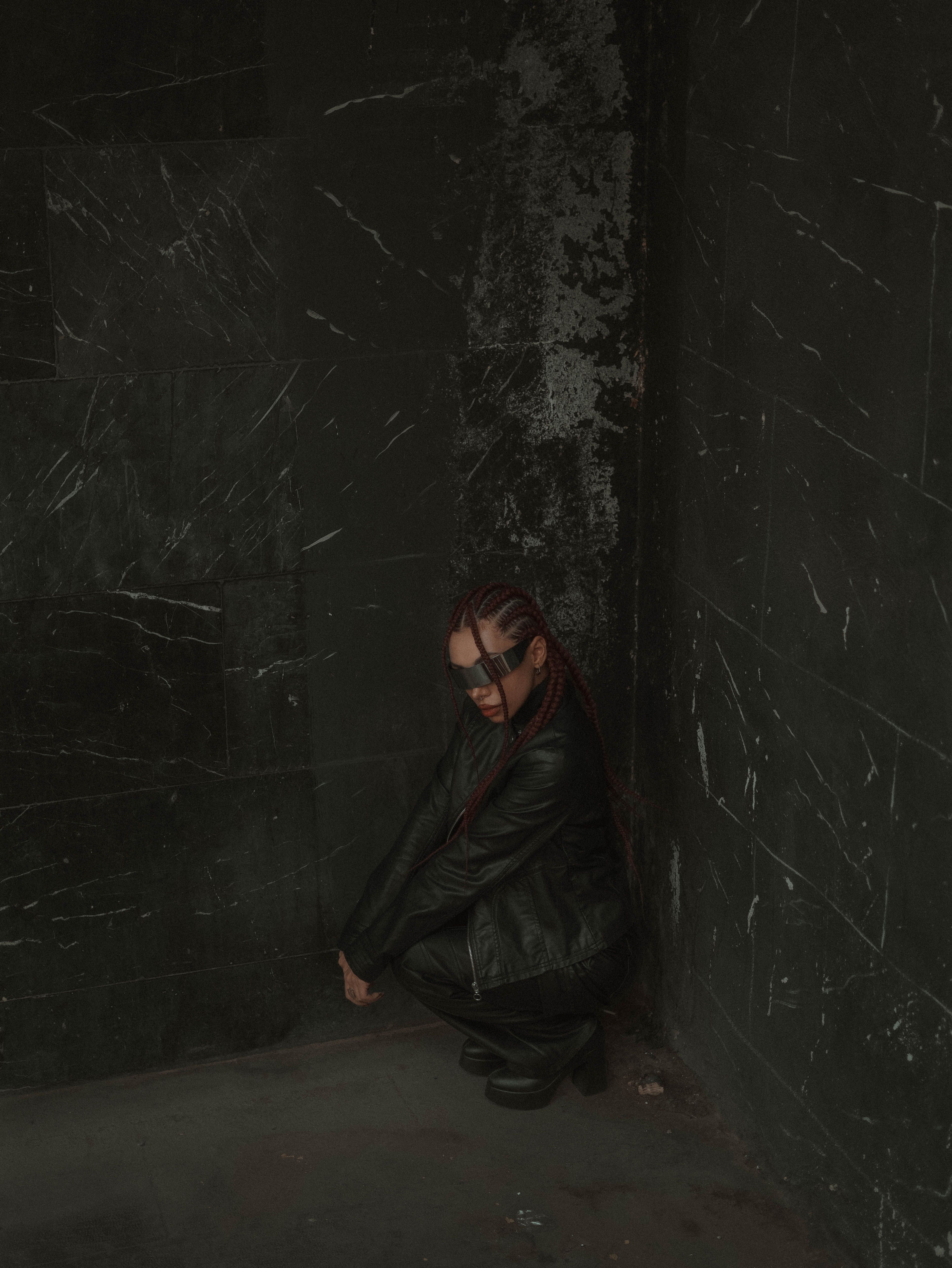 Moody Portrait of Person in Dark Urban Setting · Free Stock Photo