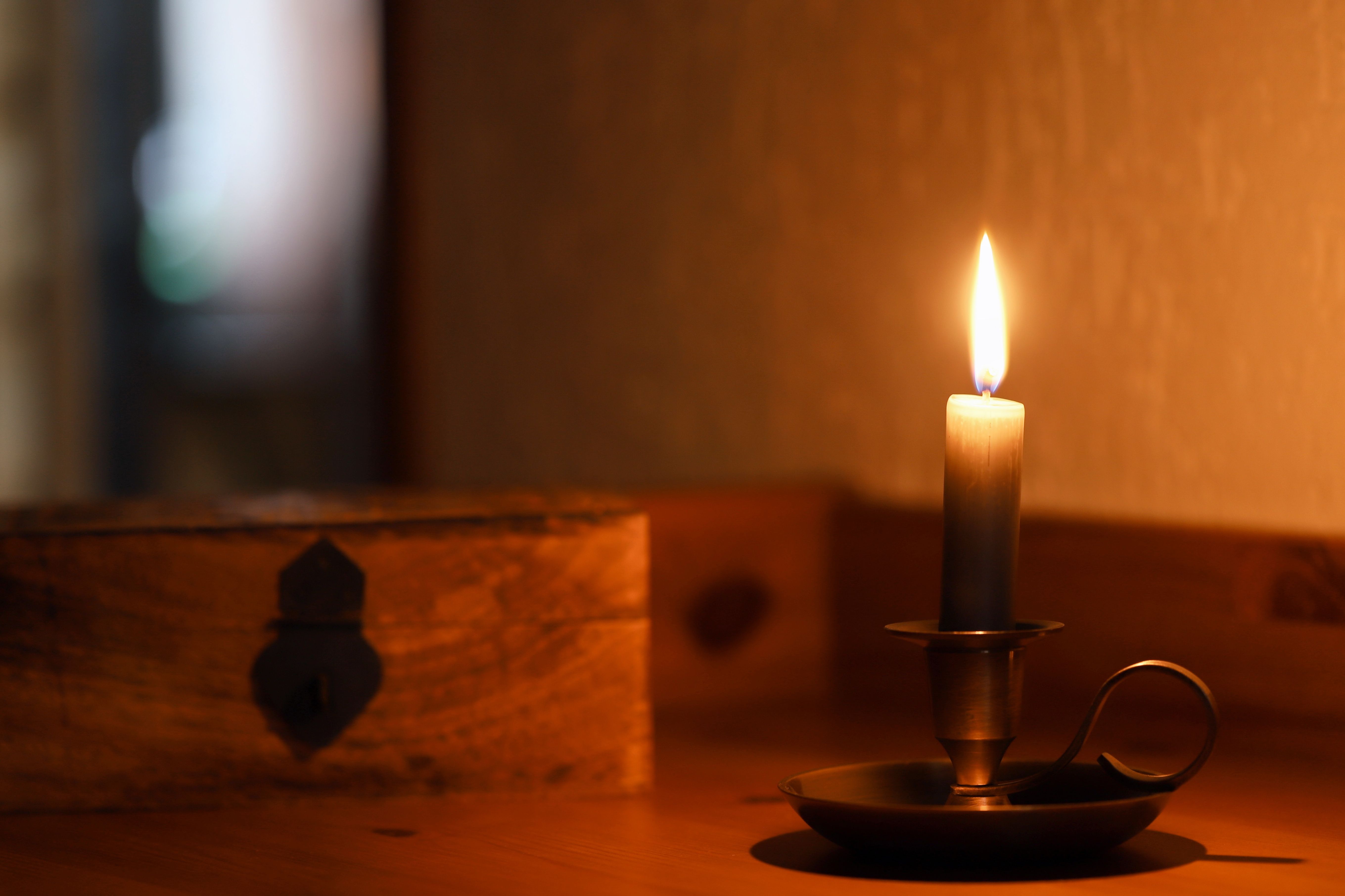 Cozy Candlelit Evening Scene with Warm Glow · Free Stock Photo