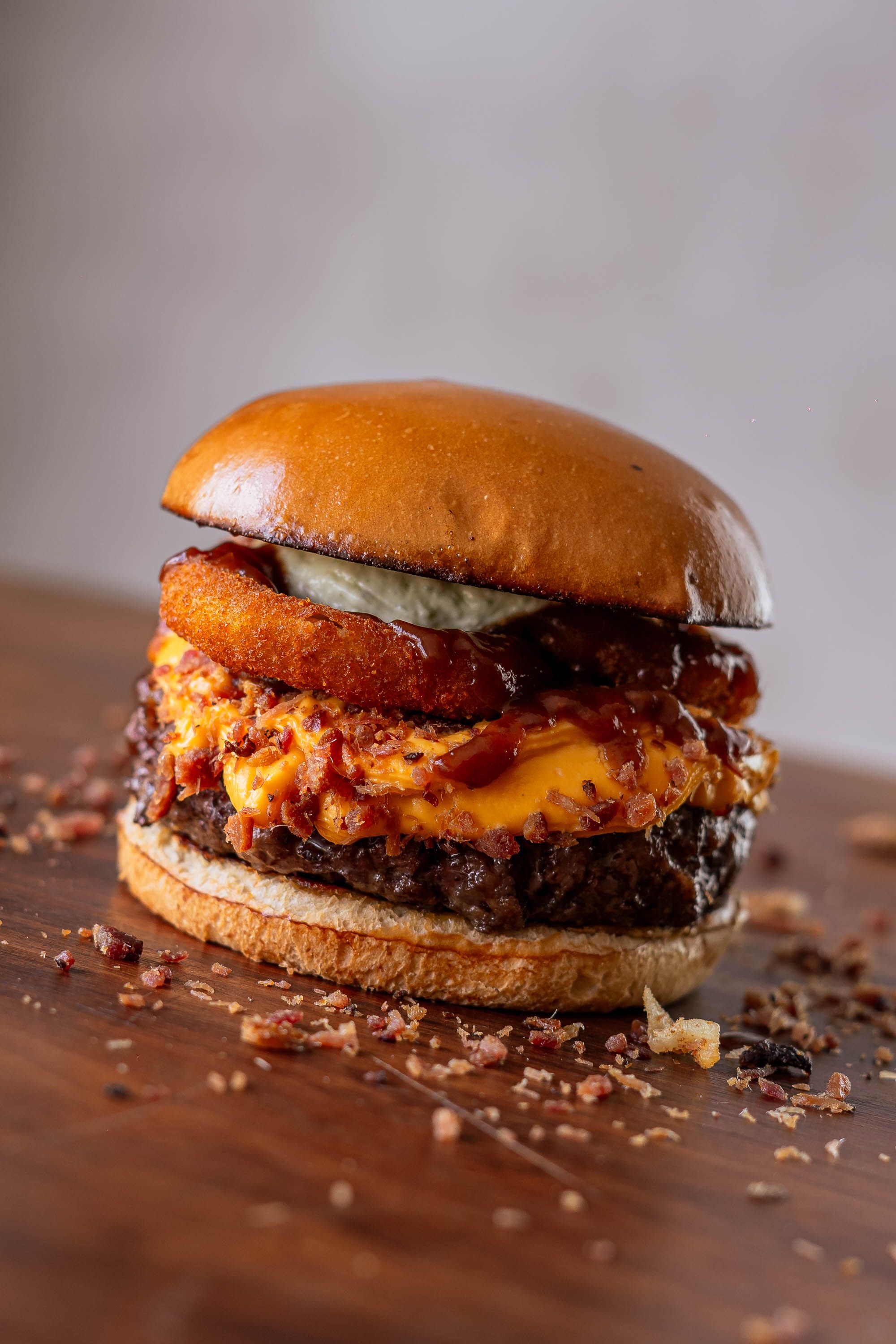 Delicious Cheeseburger with Onion Ring Topping · Free Stock Photo