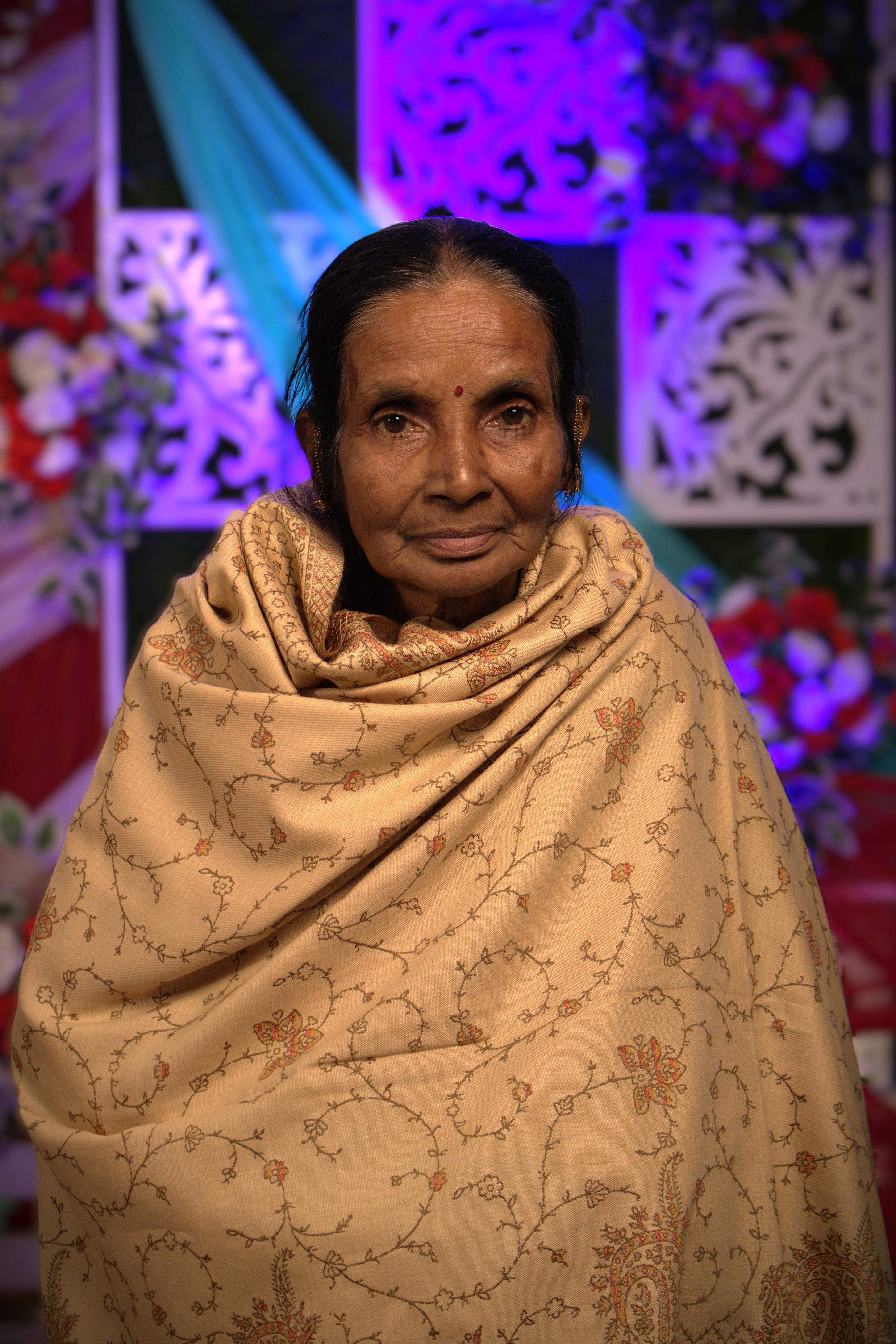 Elderly Woman in Traditional Shawl Portrait · Free Stock Photo
