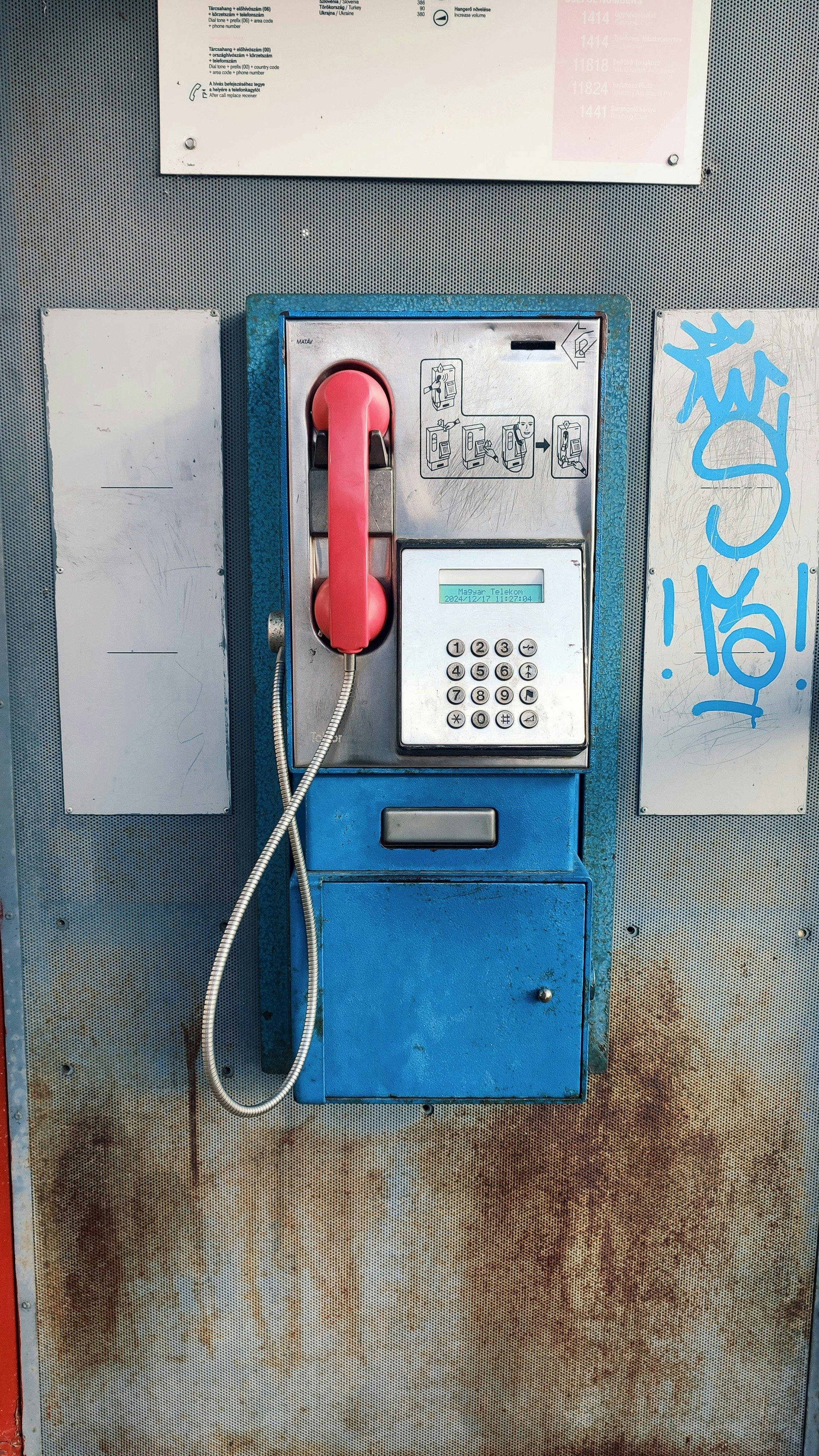Vintage Public Payphone with Red Handset · Free Stock Photo