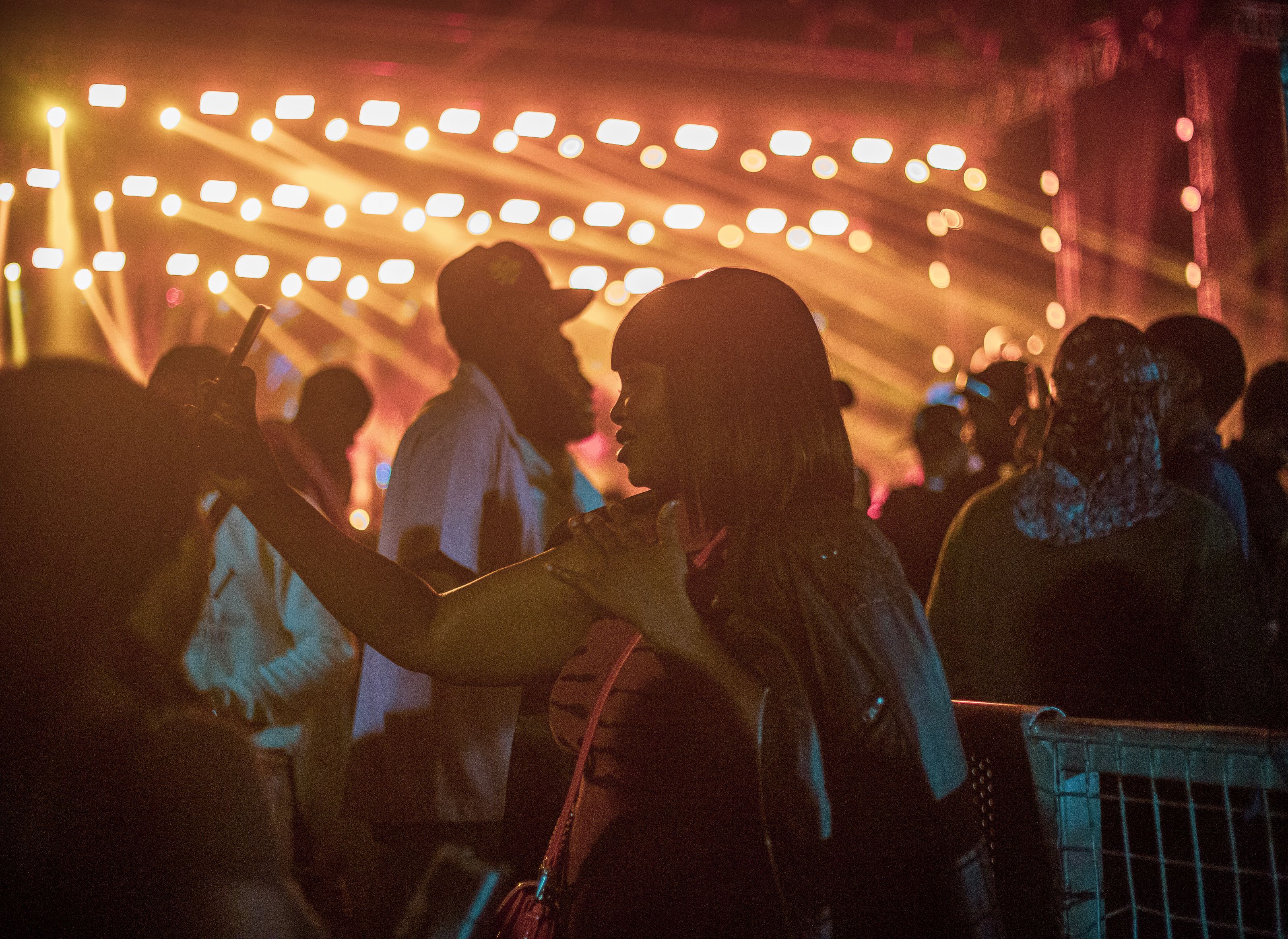Vibrant Nightlife Scene with Partygoers · Free Stock Photo