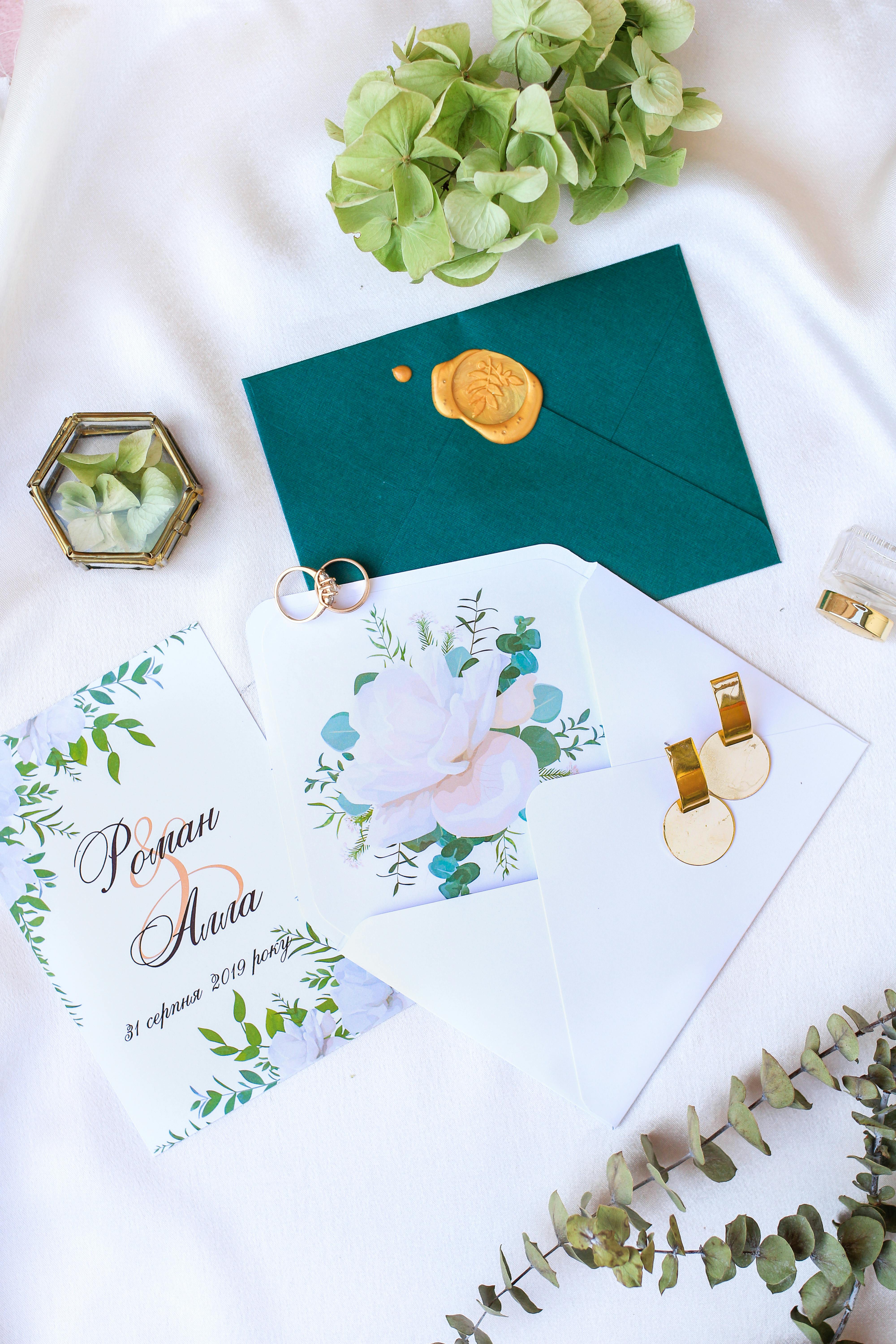 Elegant Wedding Invitation Flat Lay with Greenery · Free Stock Photo