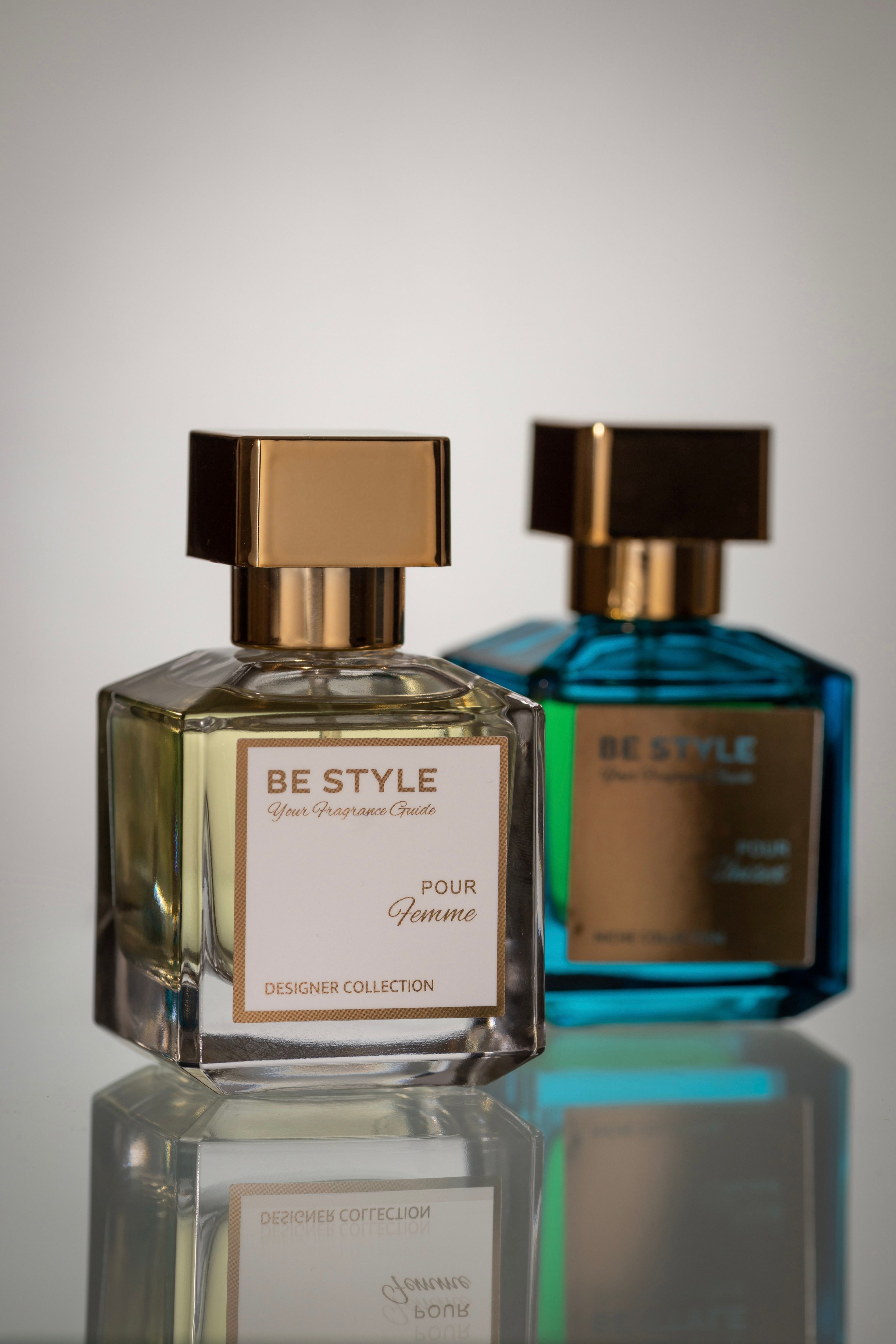 Elegant Be Style Perfume Bottles Showcase · Free Stock Photo