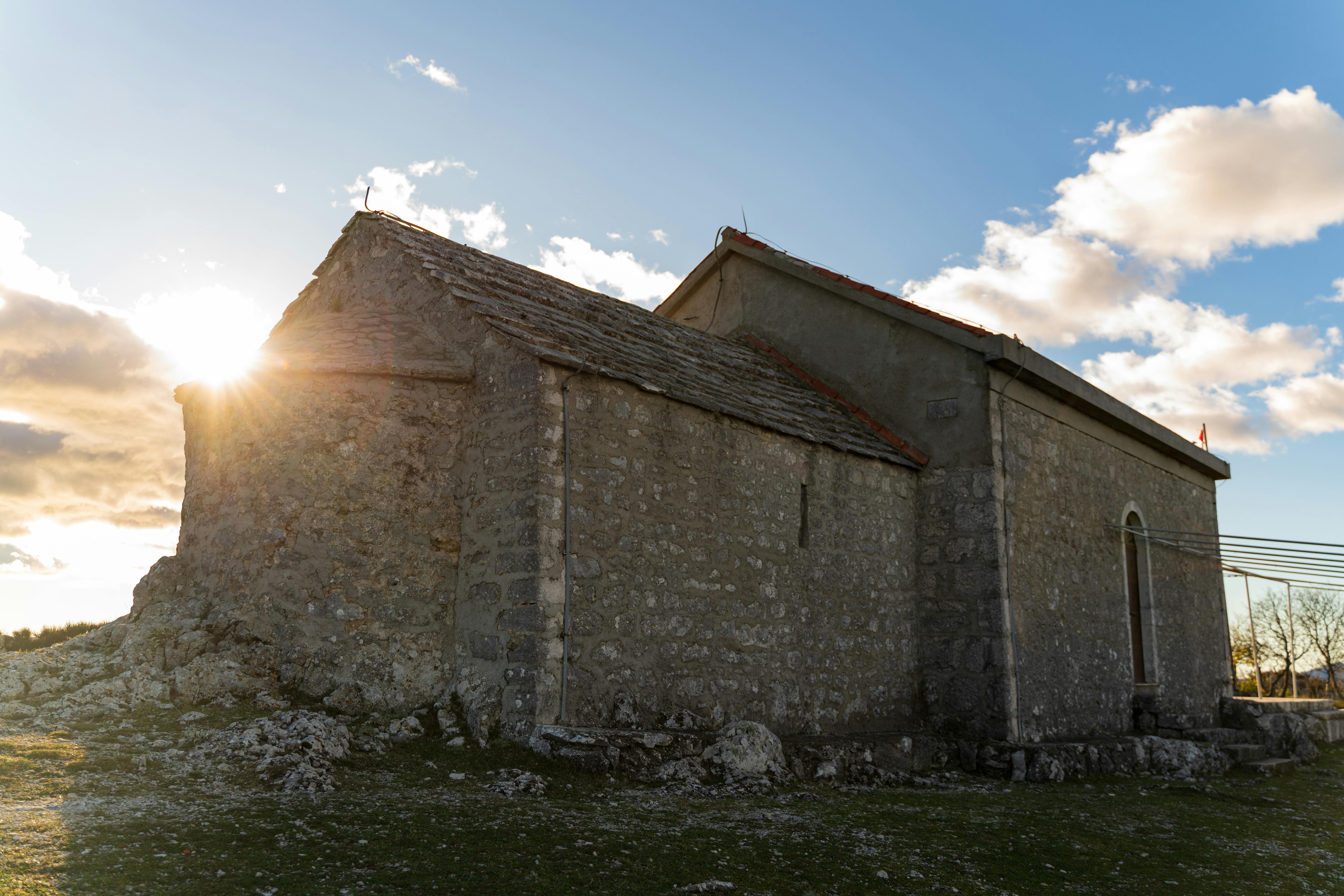 Historic Stone Church at Sunset · Free Stock Photo