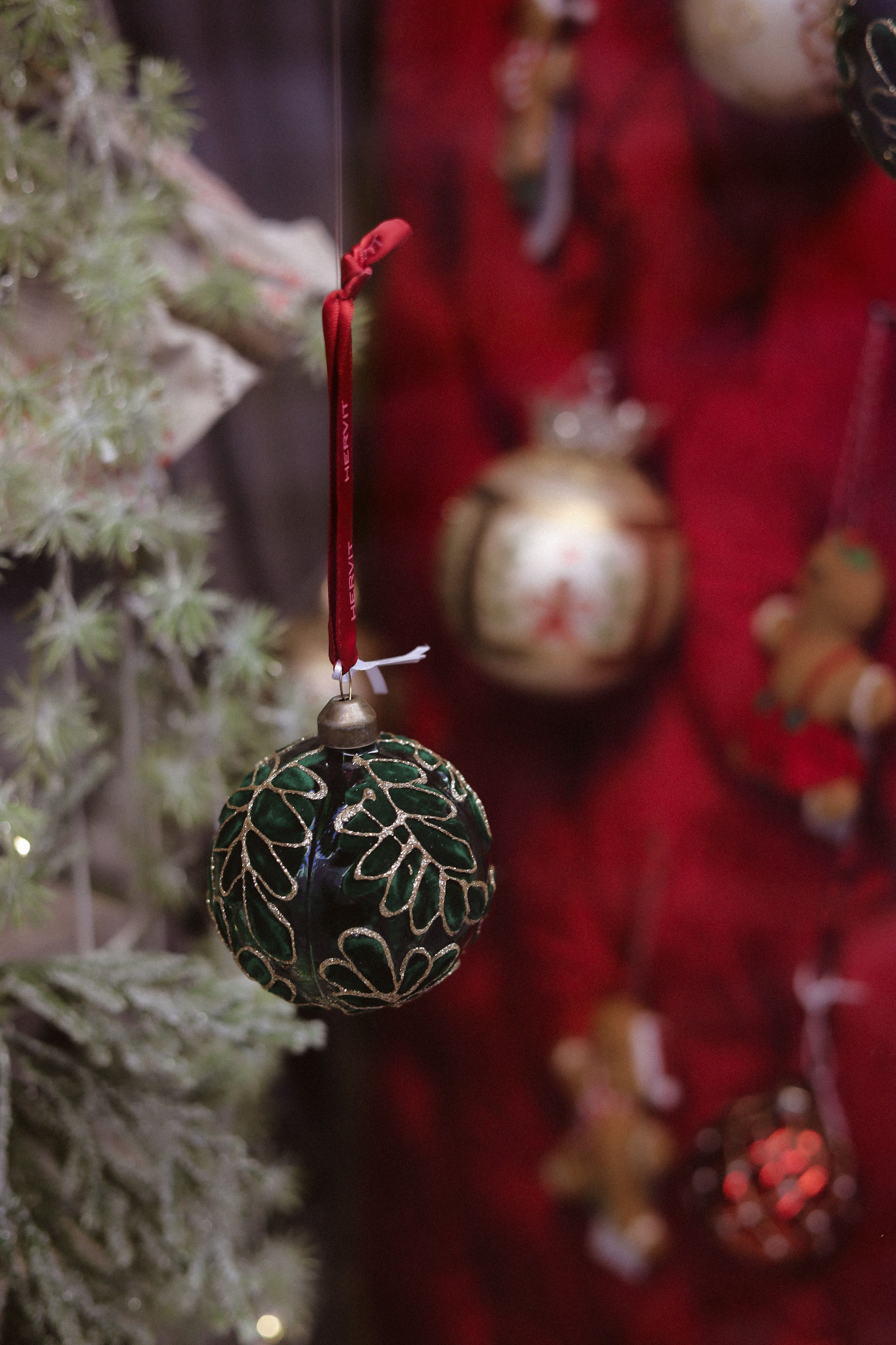 Festive Holiday Ornaments on Christmas Tree · Free Stock Photo
