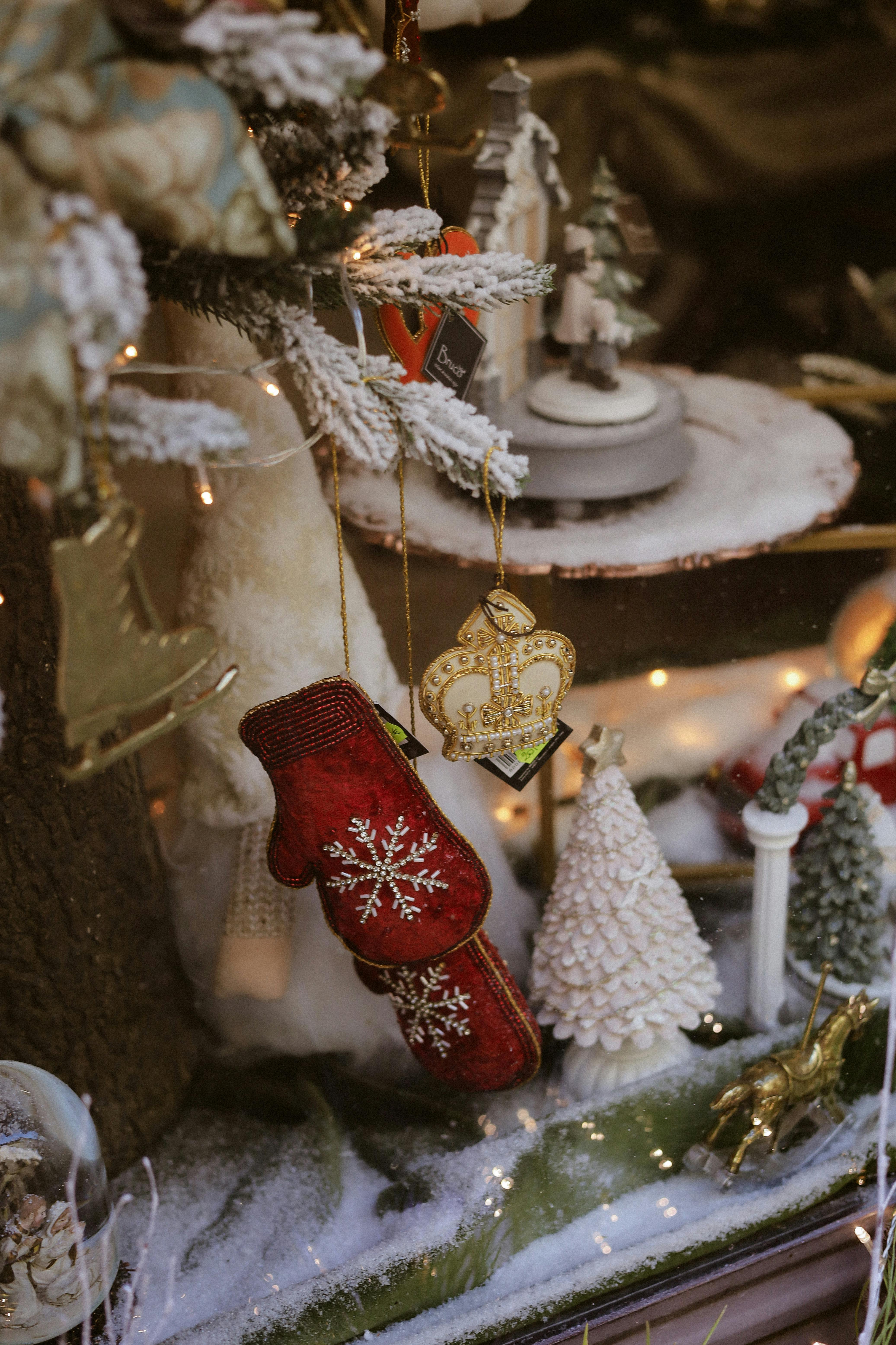 Charming Christmas Decorations in Festive Window Display · Free Stock Photo