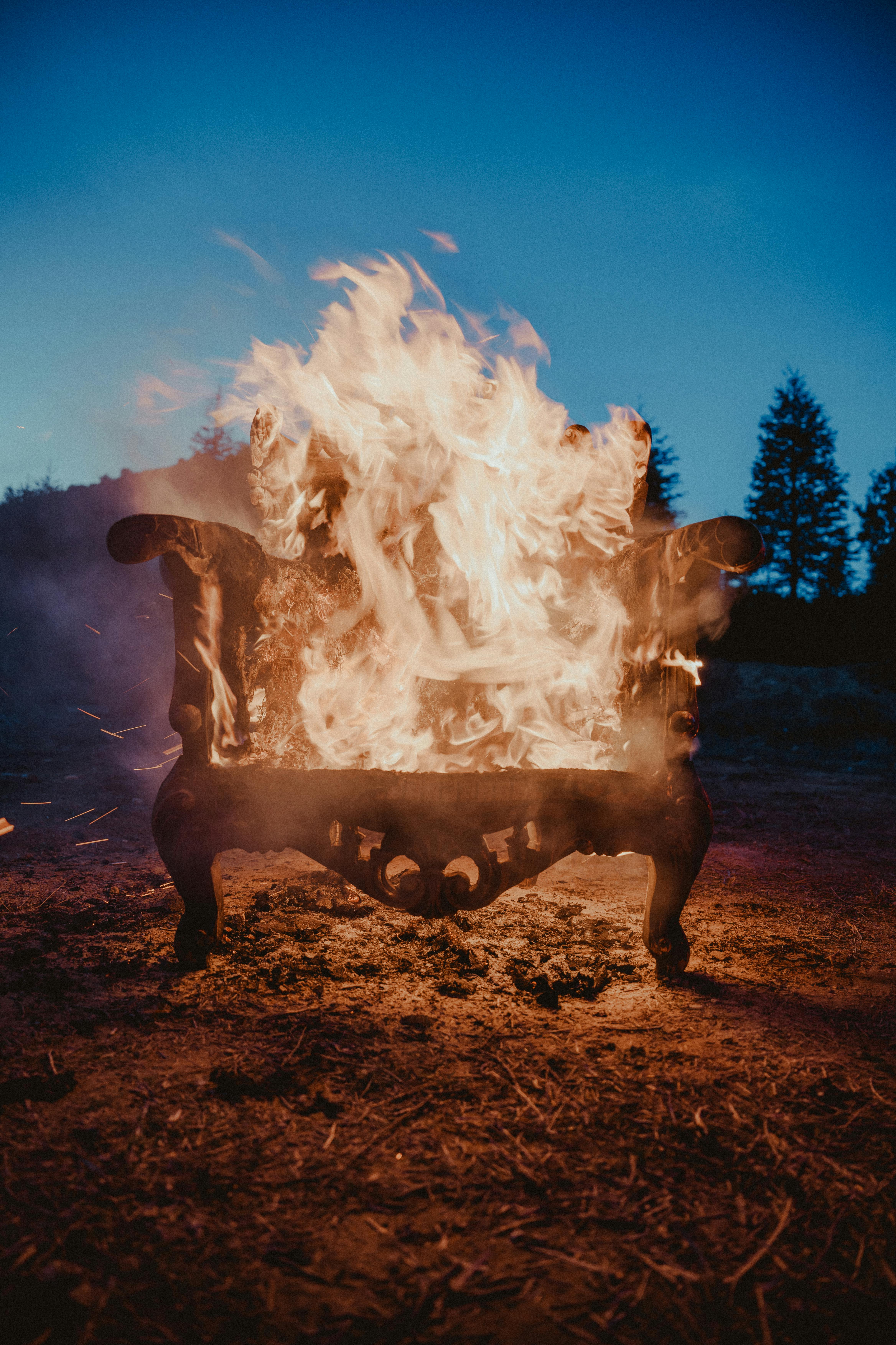 Dramatic Burning Wooden Chair at Dusk · Free Stock Photo