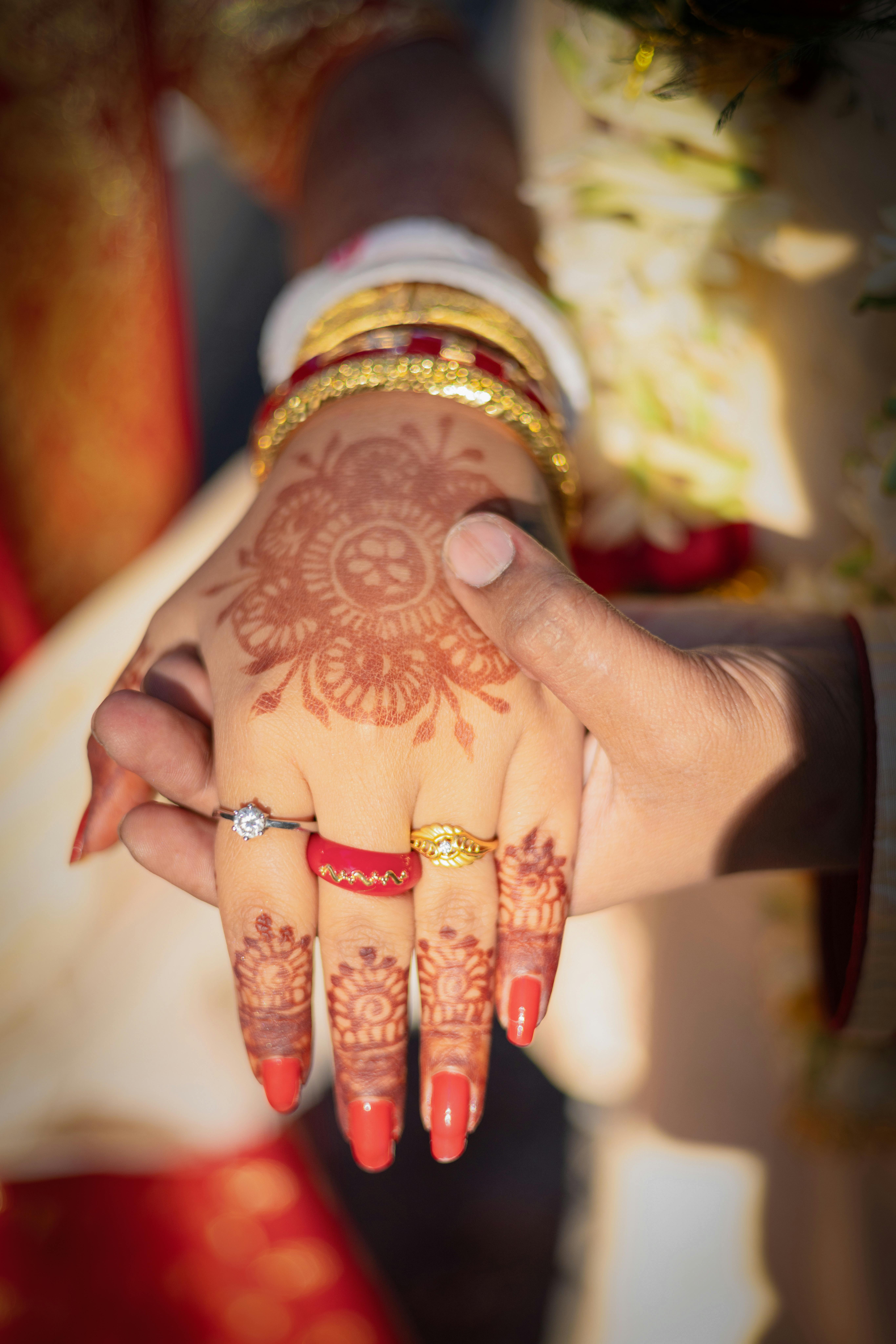Elegant Hand Mehndi with Traditional Jewelry · Free Stock Photo