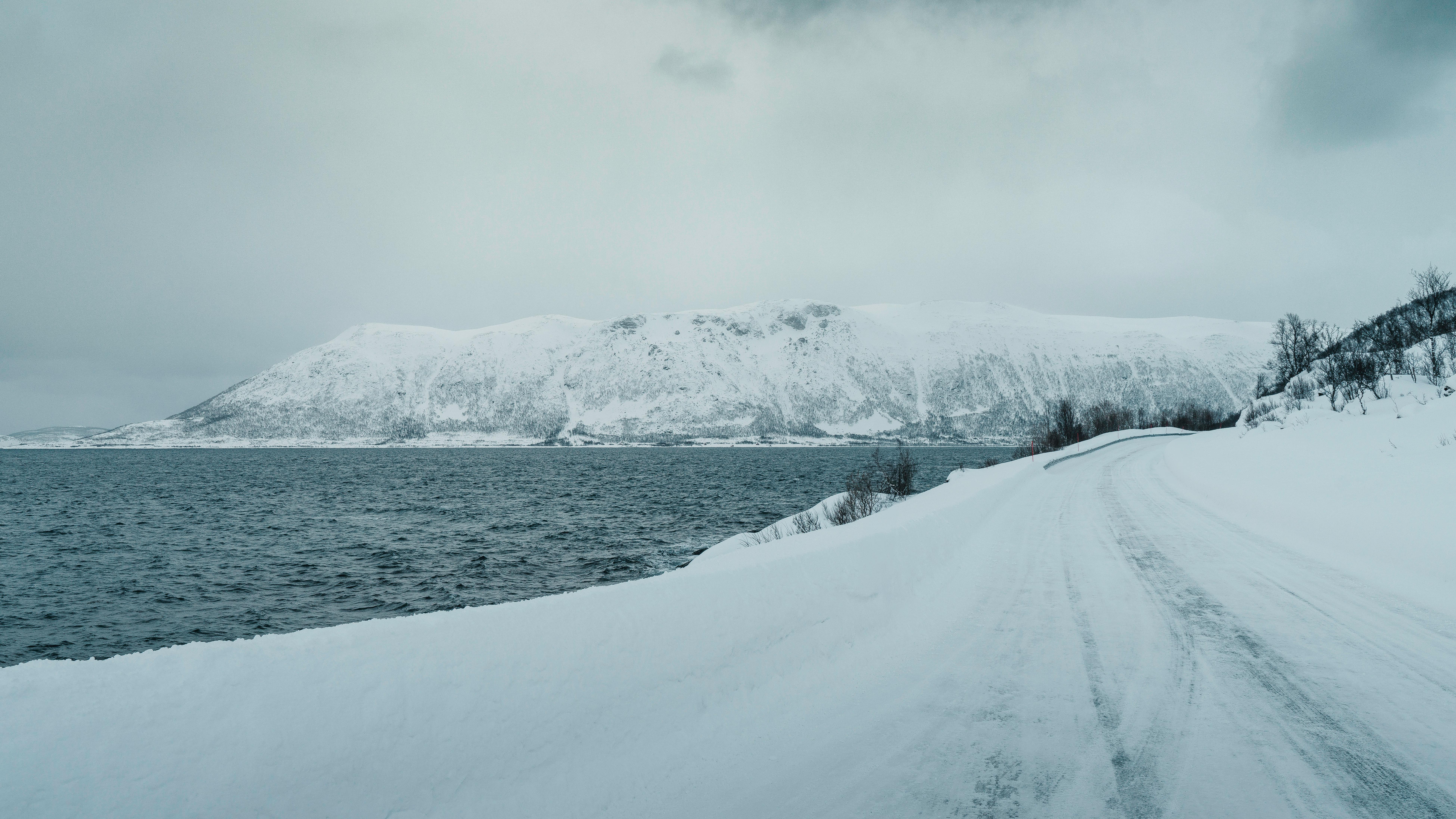 Scenic Snowy Norwegian Coastal Landscape · Free Stock Photo