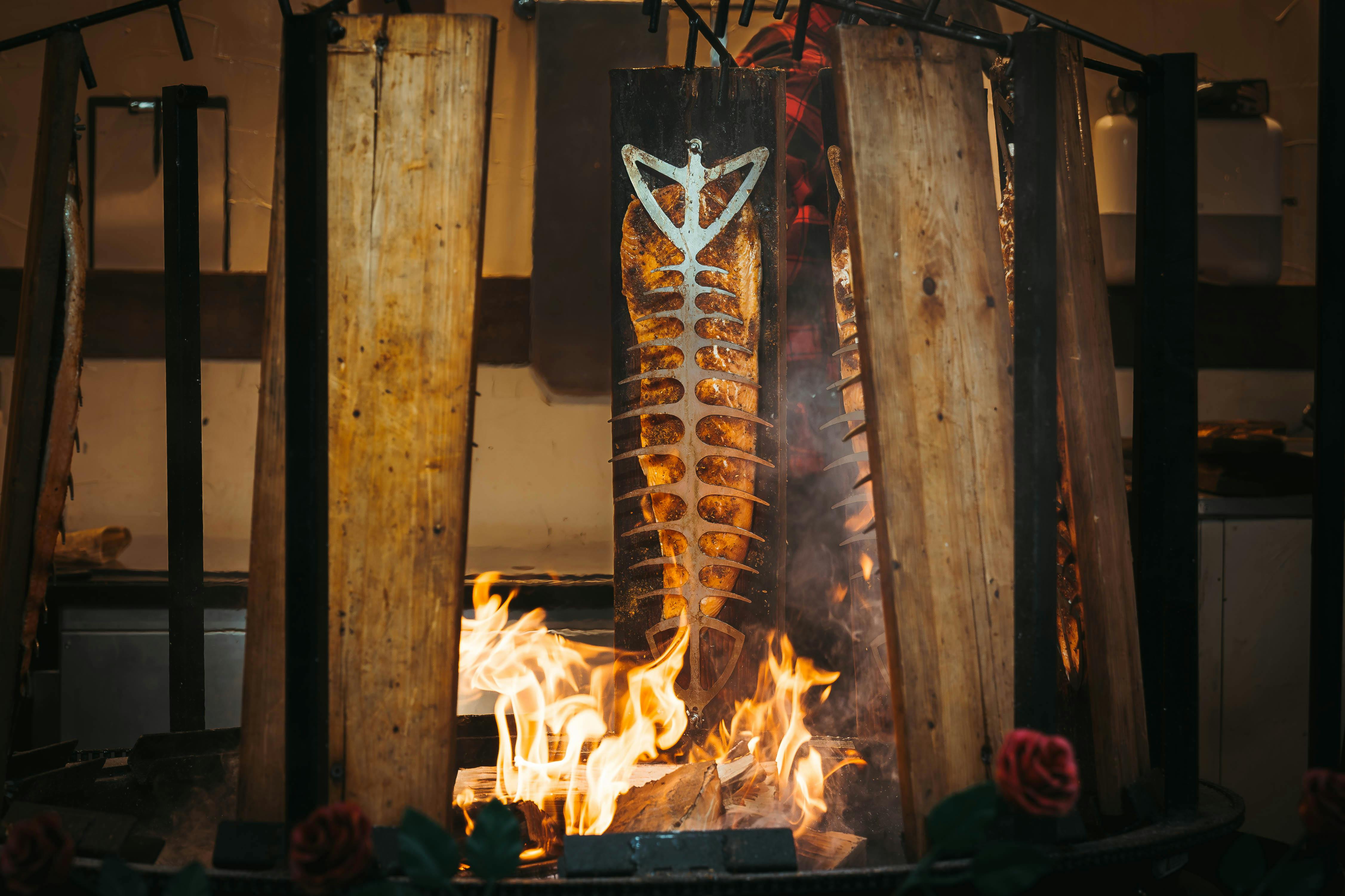 Traditional Fish Grilling over Open Fire · Free Stock Photo