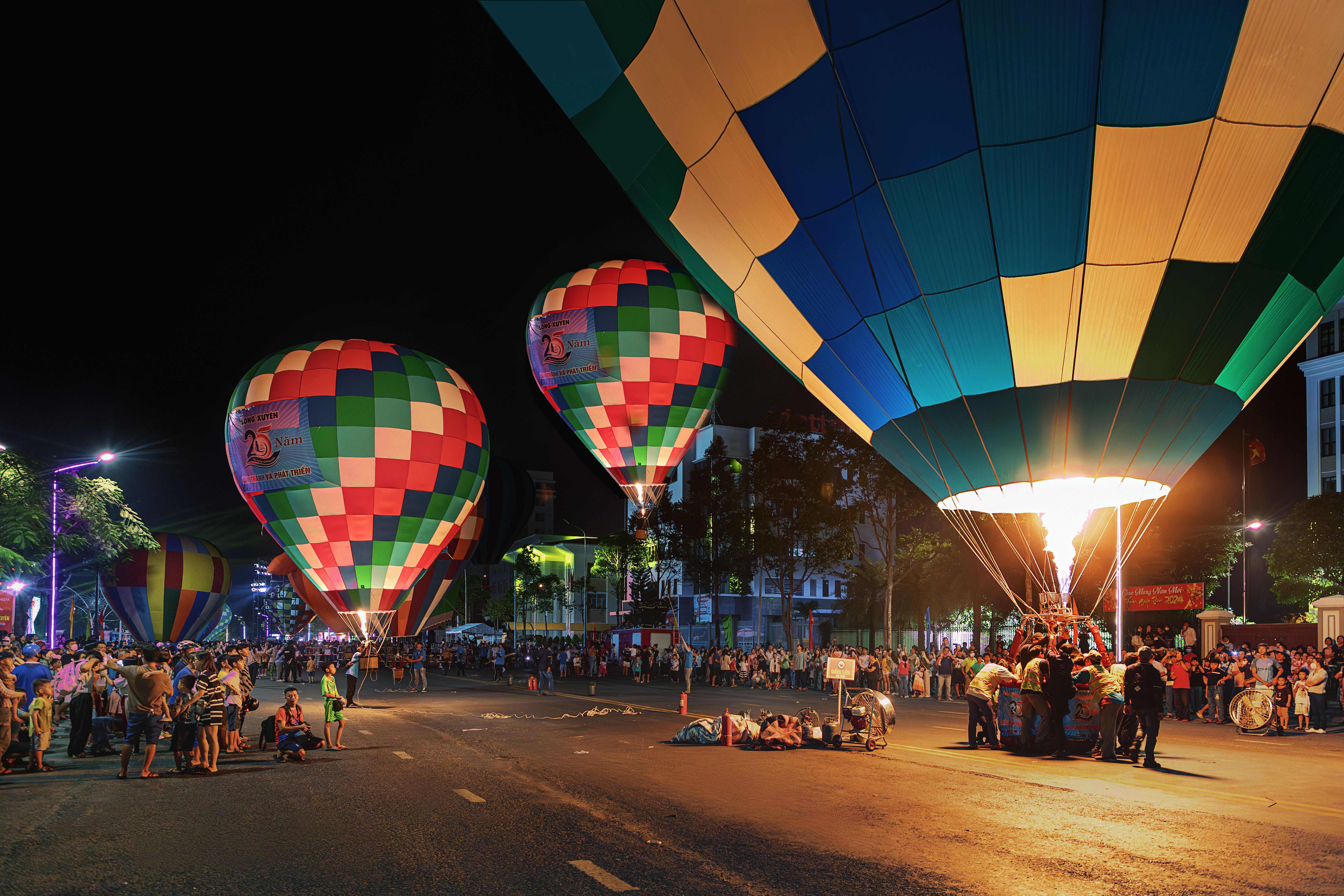 Vibrant Night Festival with Hot Air Balloons · Free Stock Photo