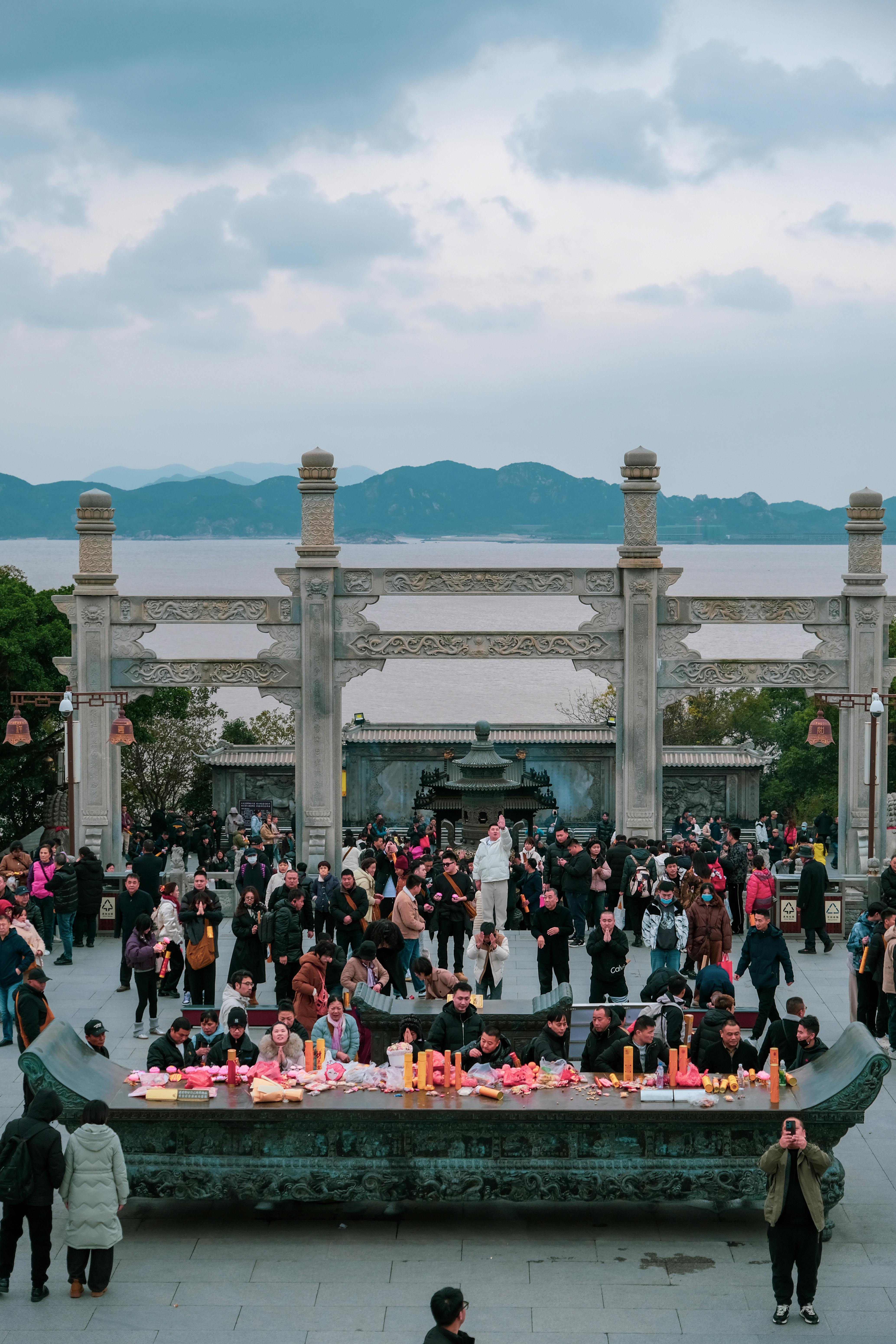 Crowd in Traditional Asian Temple Courtyard · Free Stock Photo