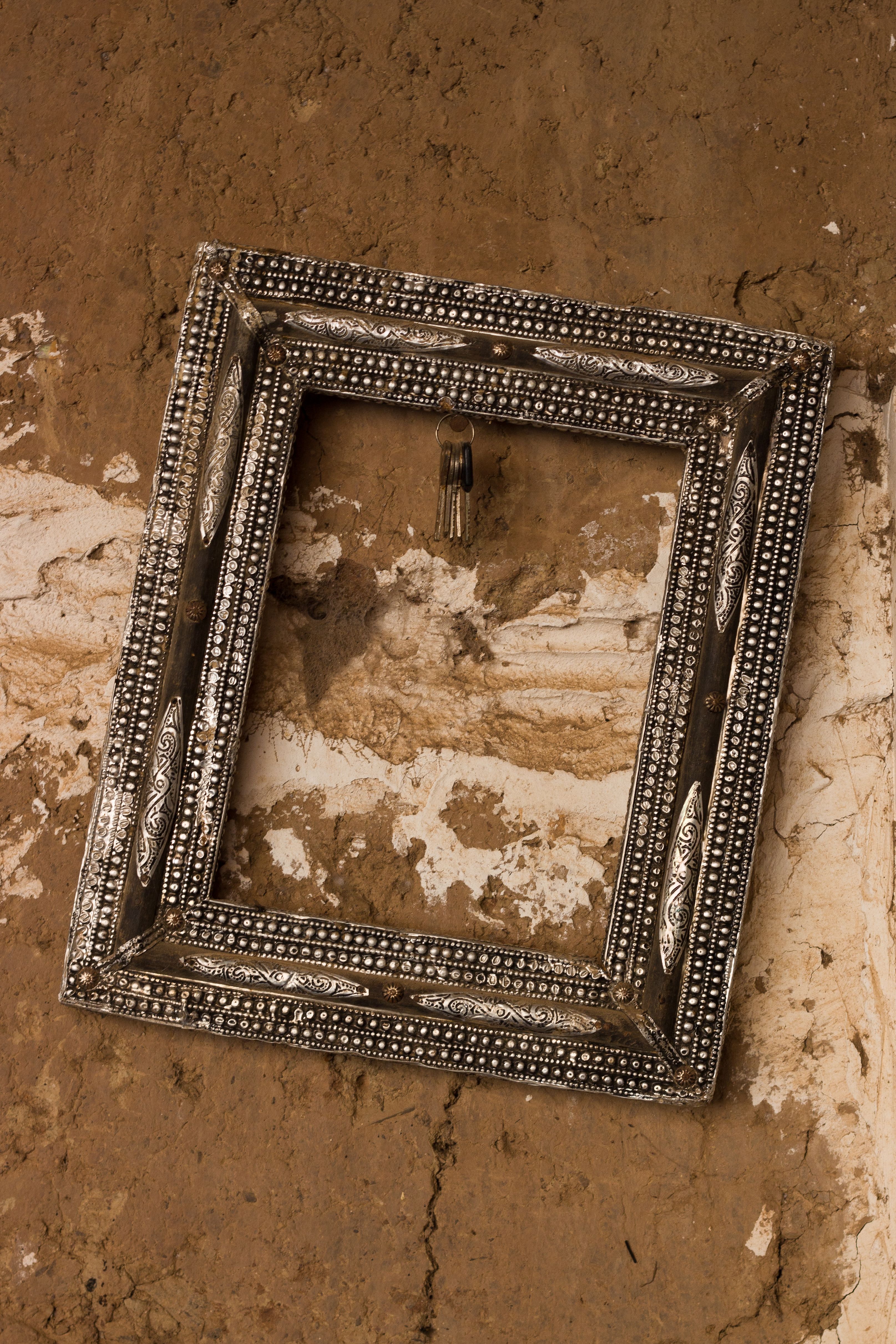 Ornate Frame on Rustic Moroccan Wall · Free Stock Photo