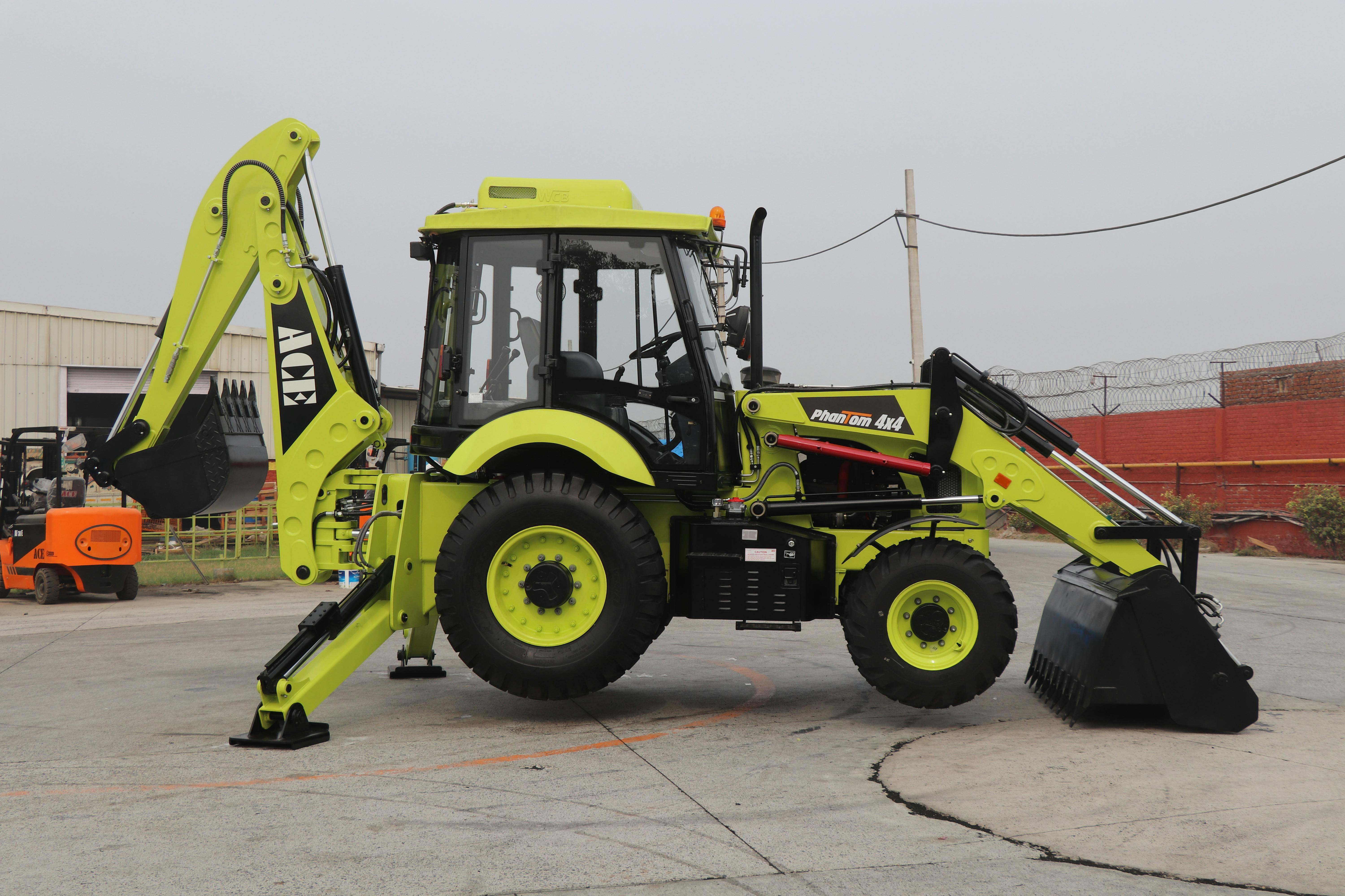 ACE Phantom 4x4 Backhoe Loader on Construction Site · Free Stock Photo