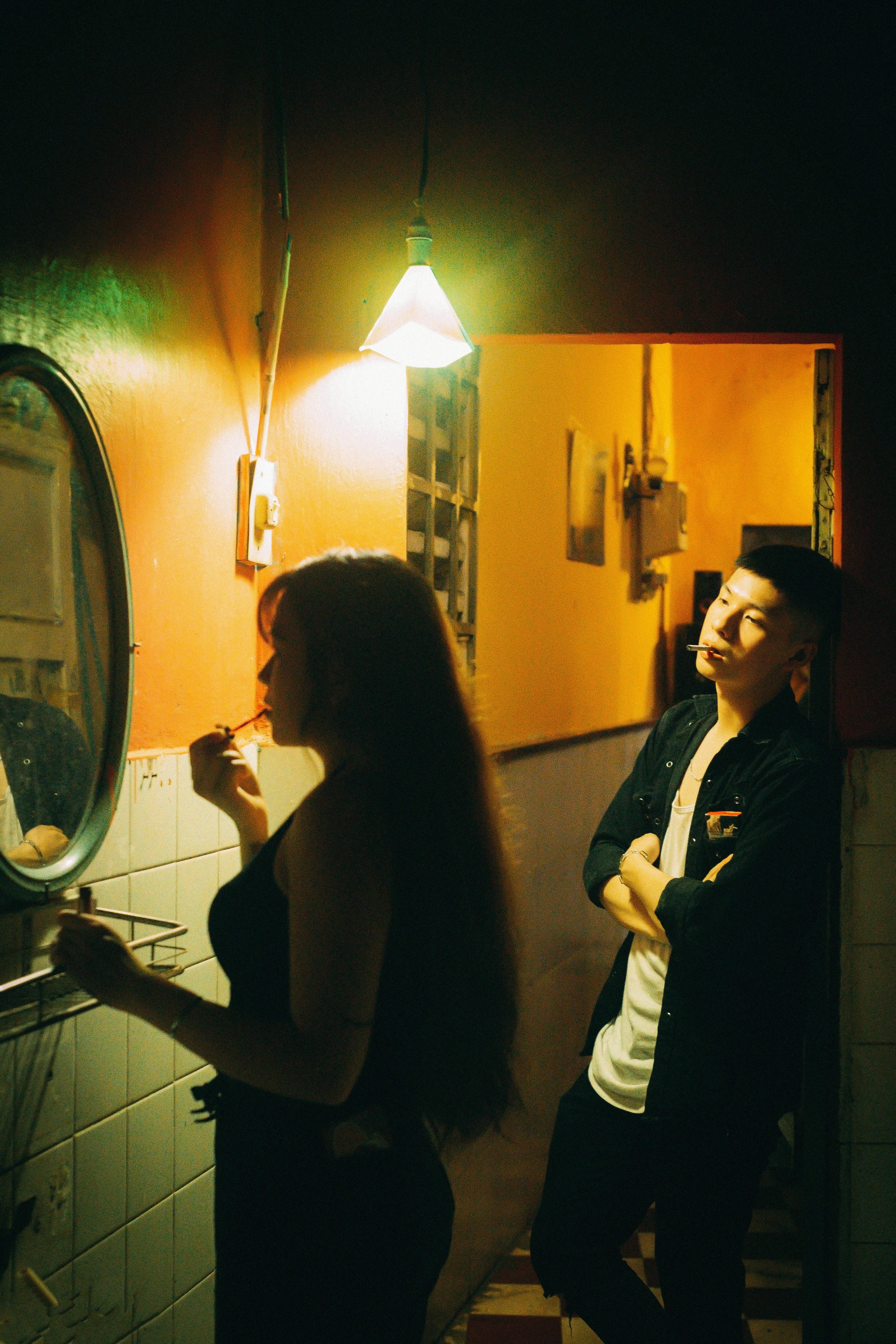 Intimate Indoor Evening Scene with Couple · Free Stock Photo