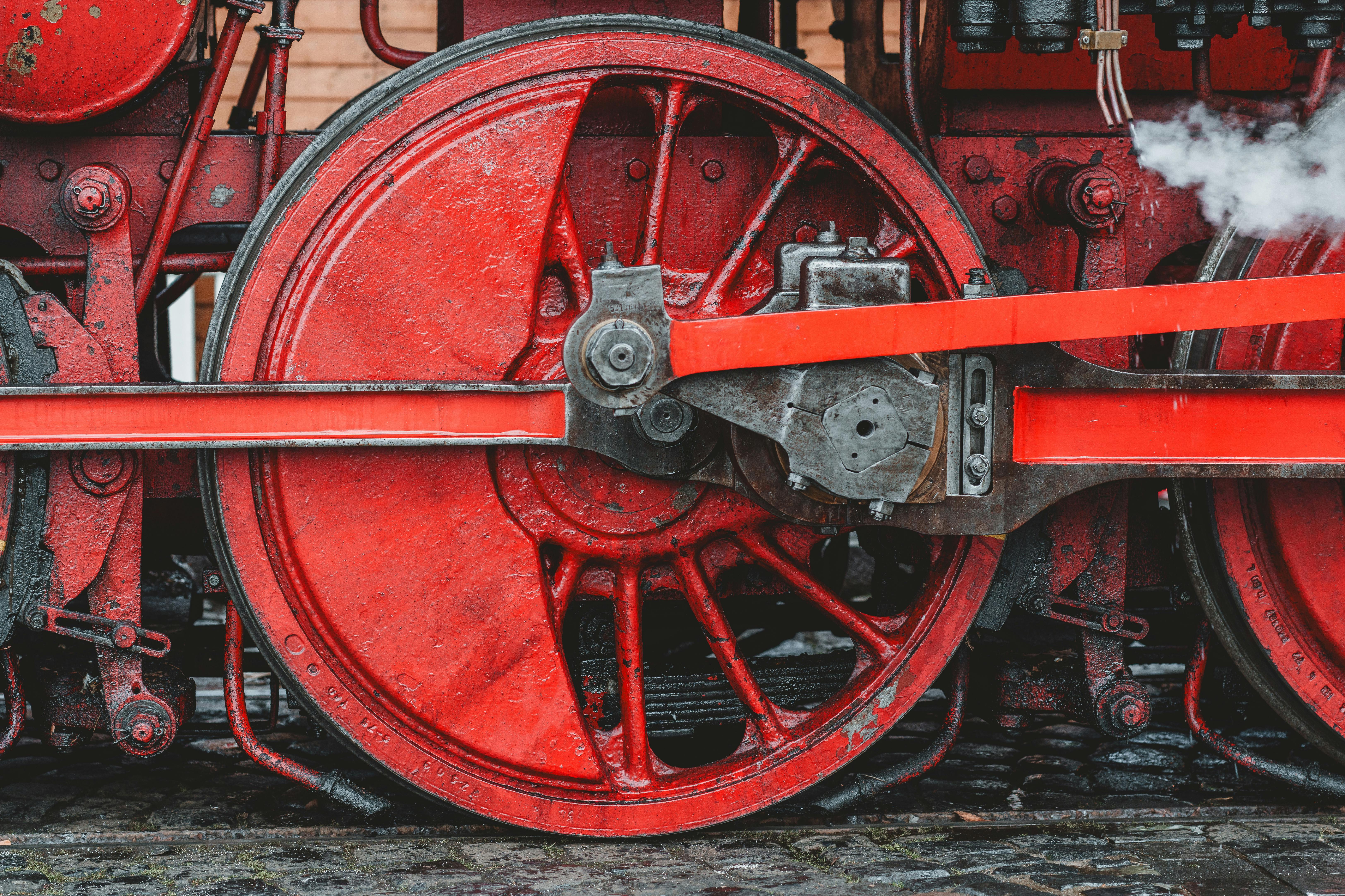 Close-up of Red Steam Locomotive Wheel · Free Stock Photo