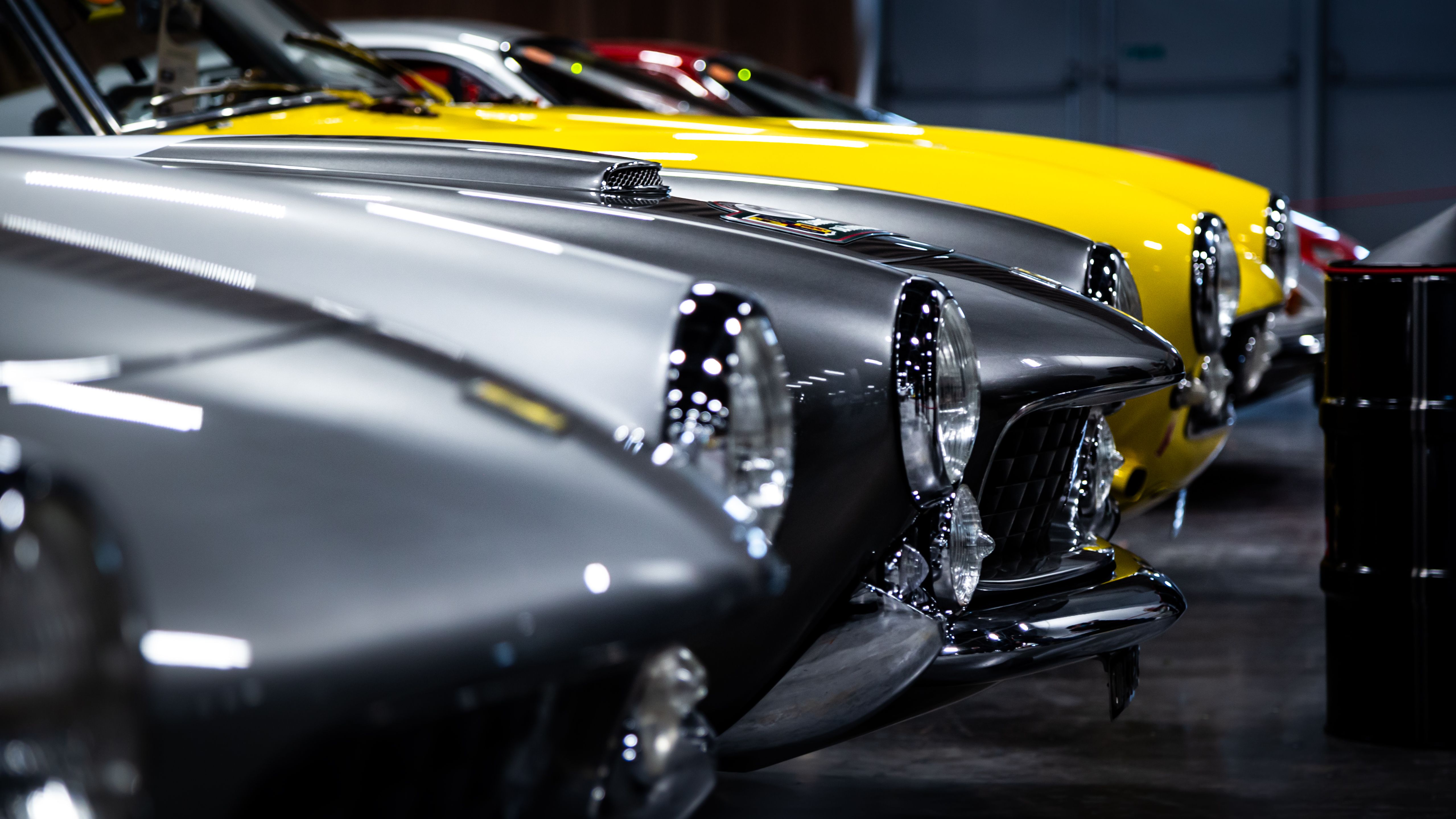 Lineup of Classic Vintage Cars in a Showroom · Free Stock Photo