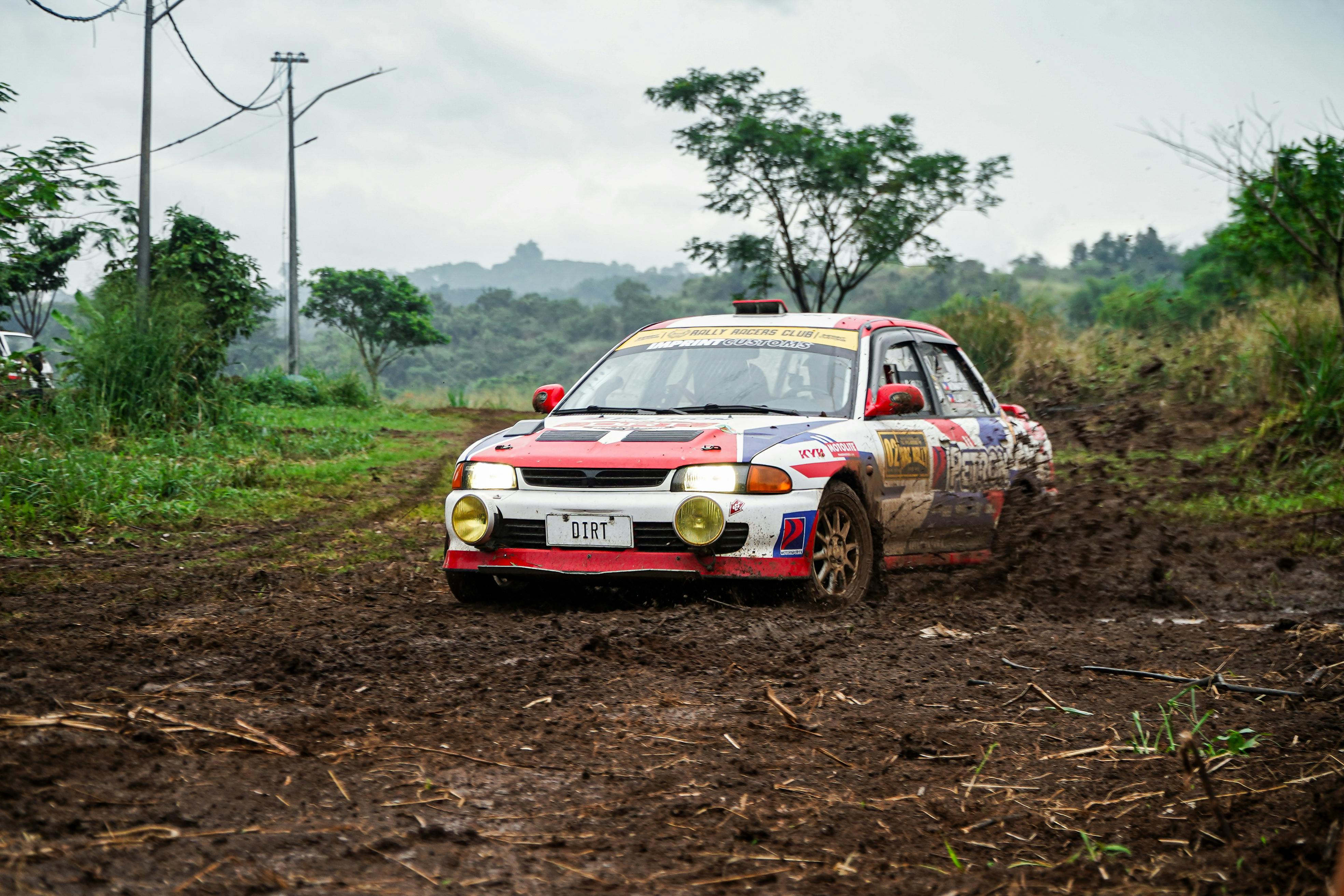 Exciting Rally Car Racing in Muddy Philippine Terrain · Free Stock Photo