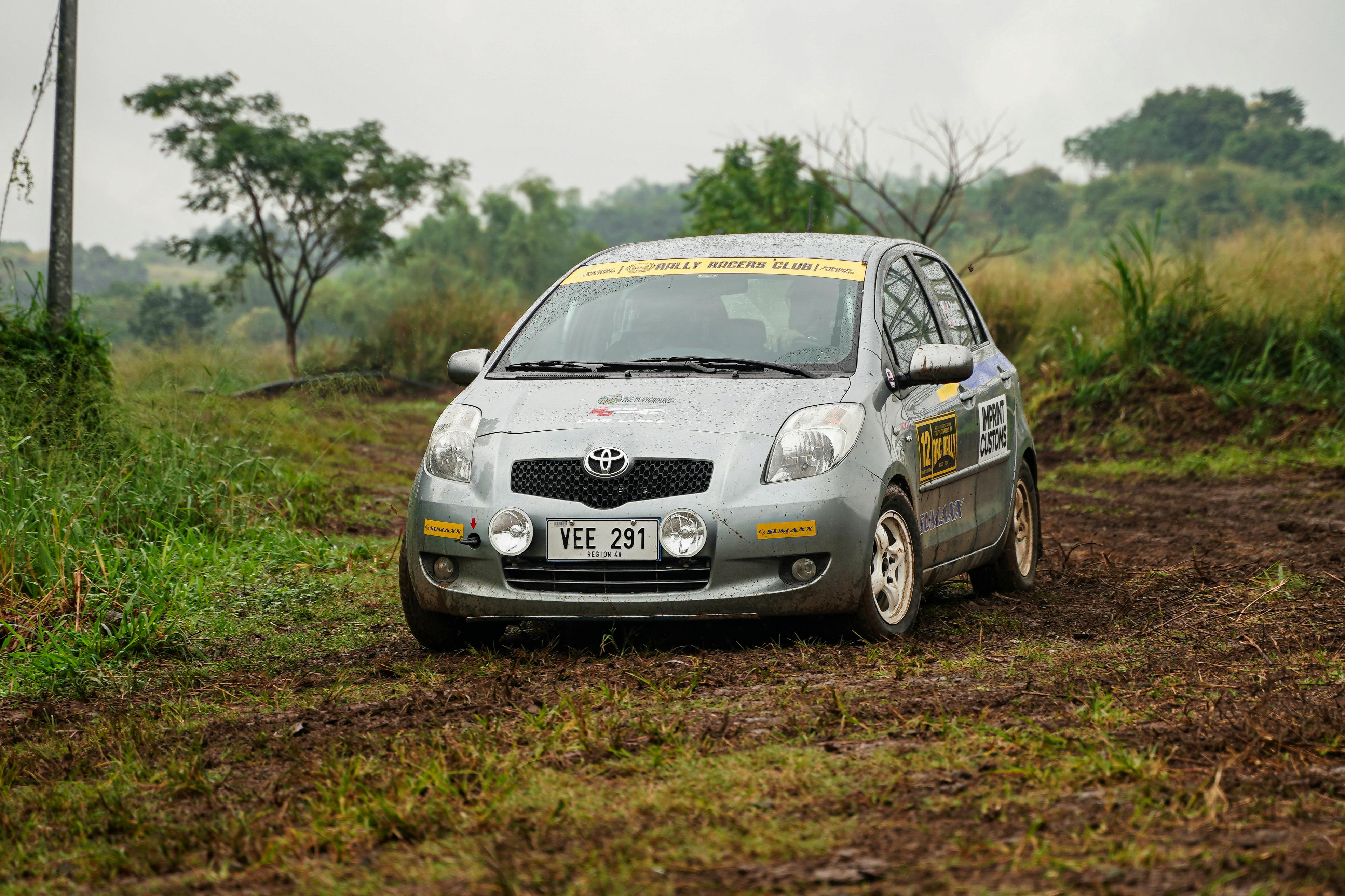 Rally Car on Muddy Terrain in Baras, Philippines · Free Stock Photo
