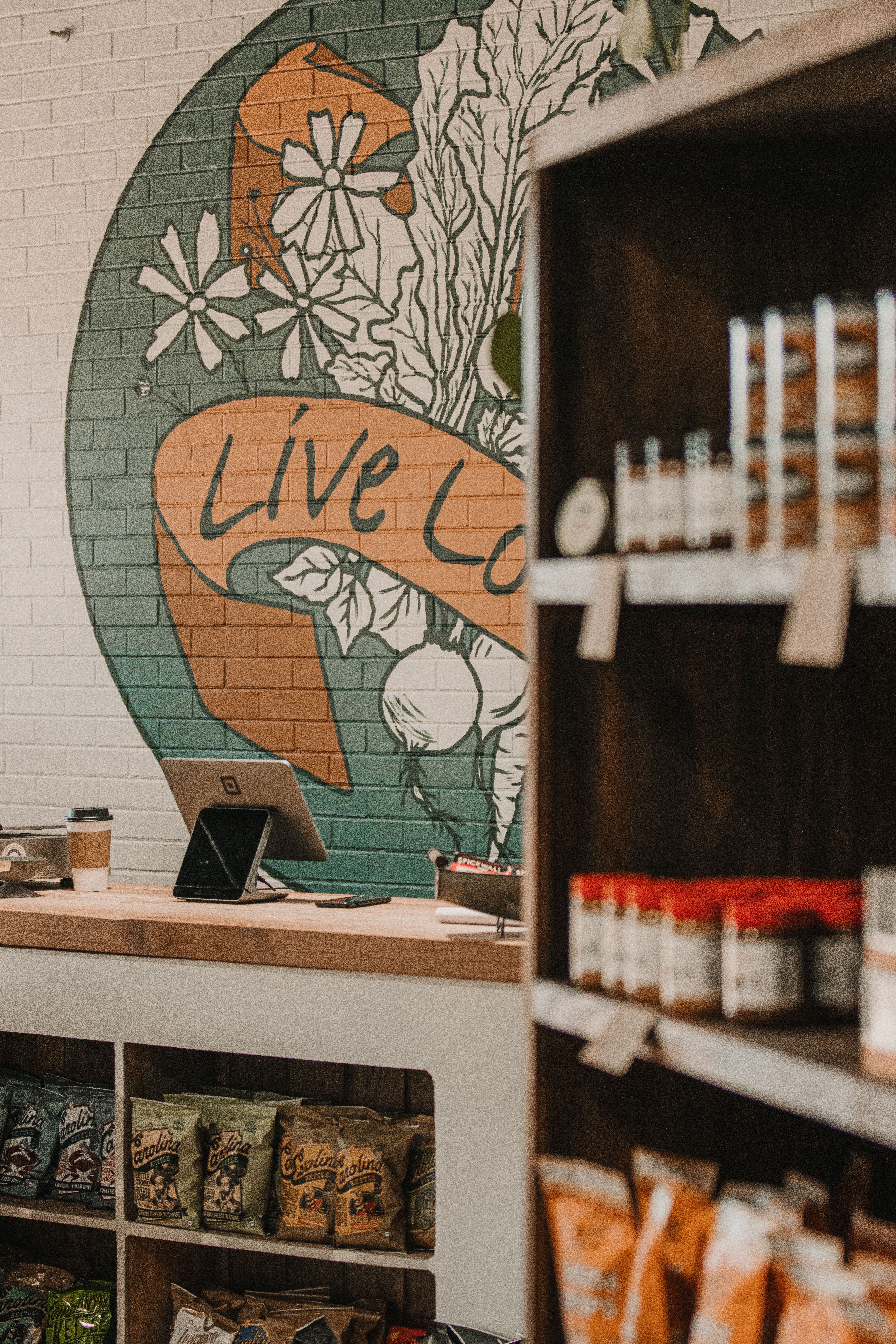 Rustic Grocery Store with Mural Art · Free Stock Photo