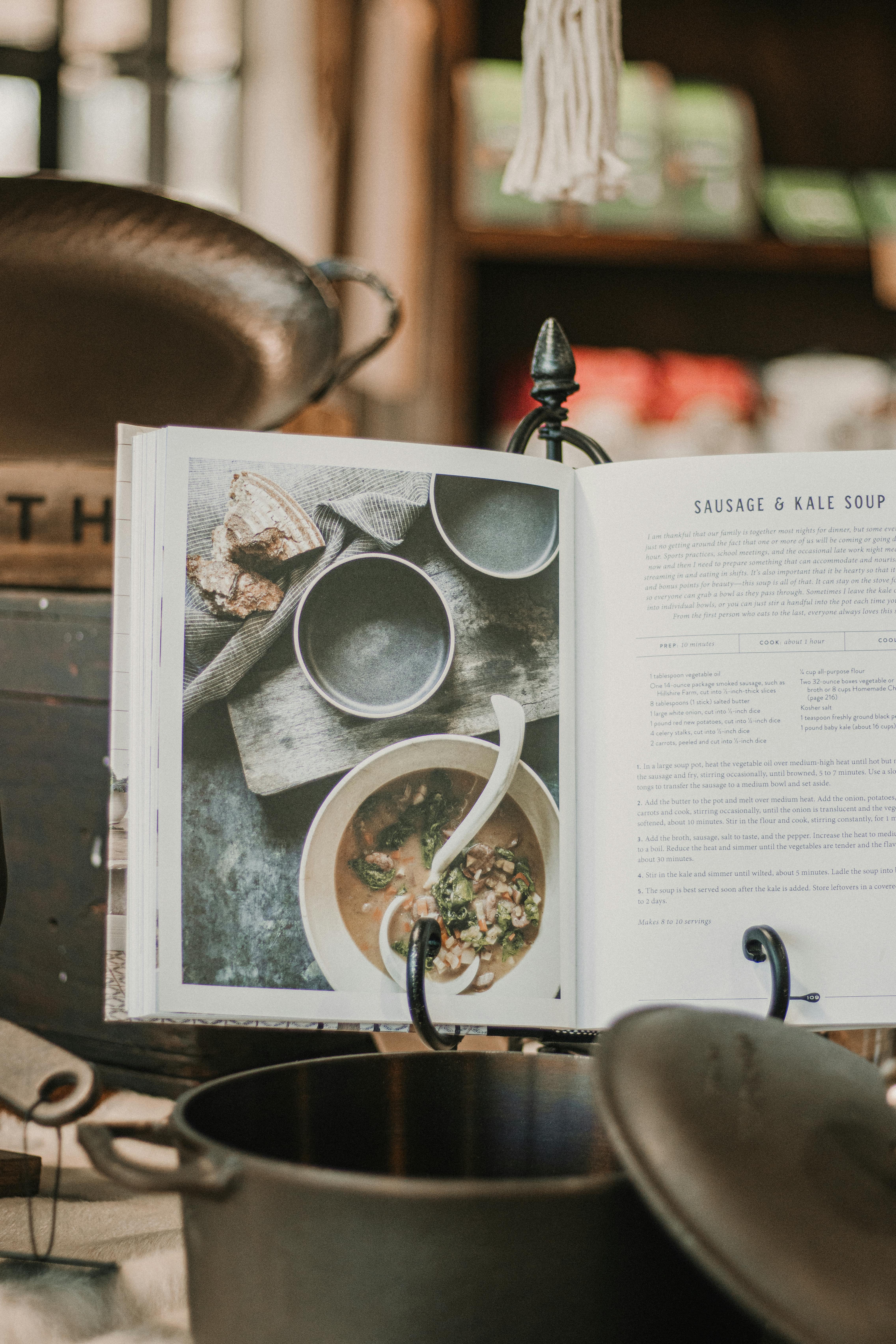 Cozy Kitchen with Cooking Book Setup · Free Stock Photo