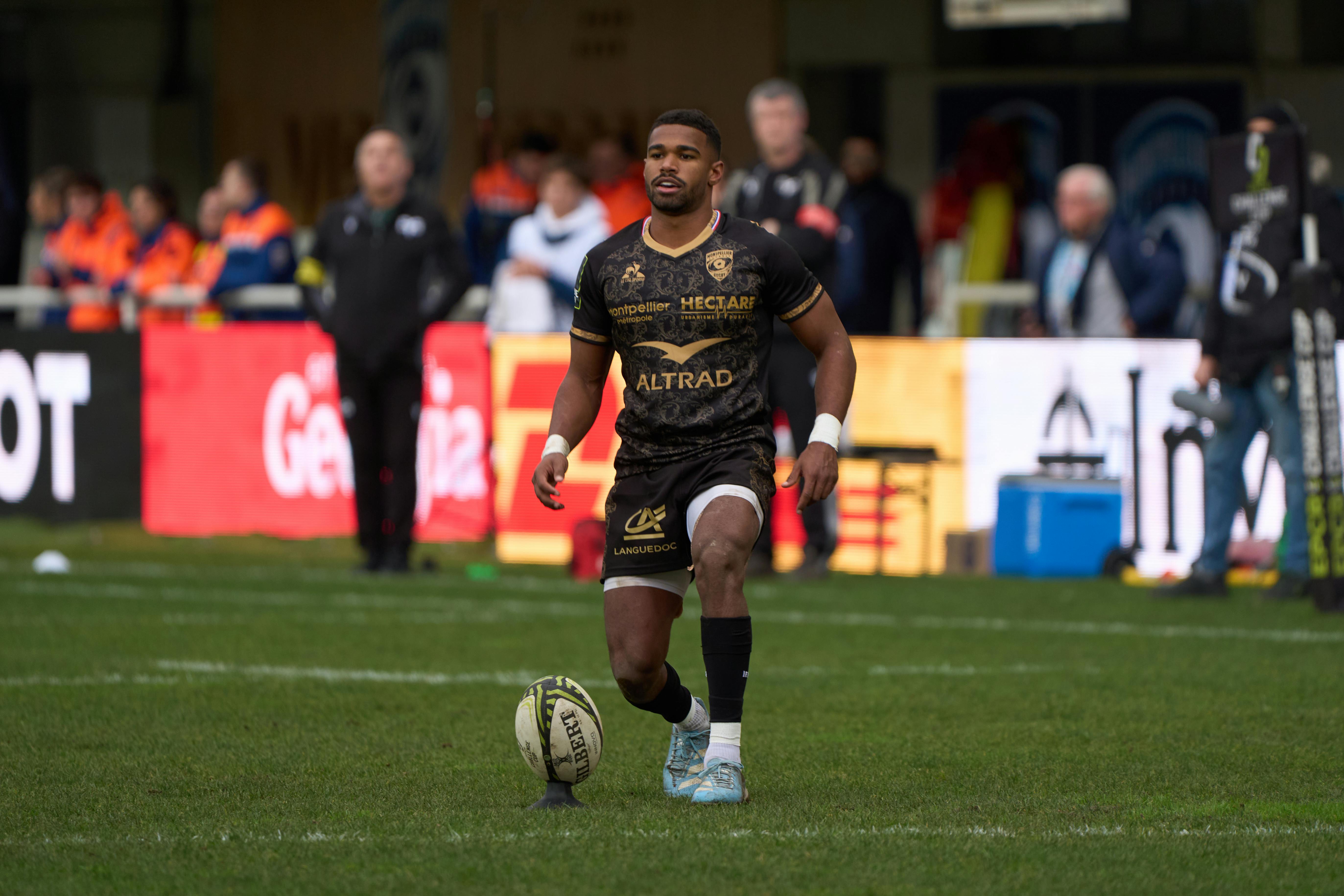 Rugby Player on Field in Montpellier, France · Free Stock Photo