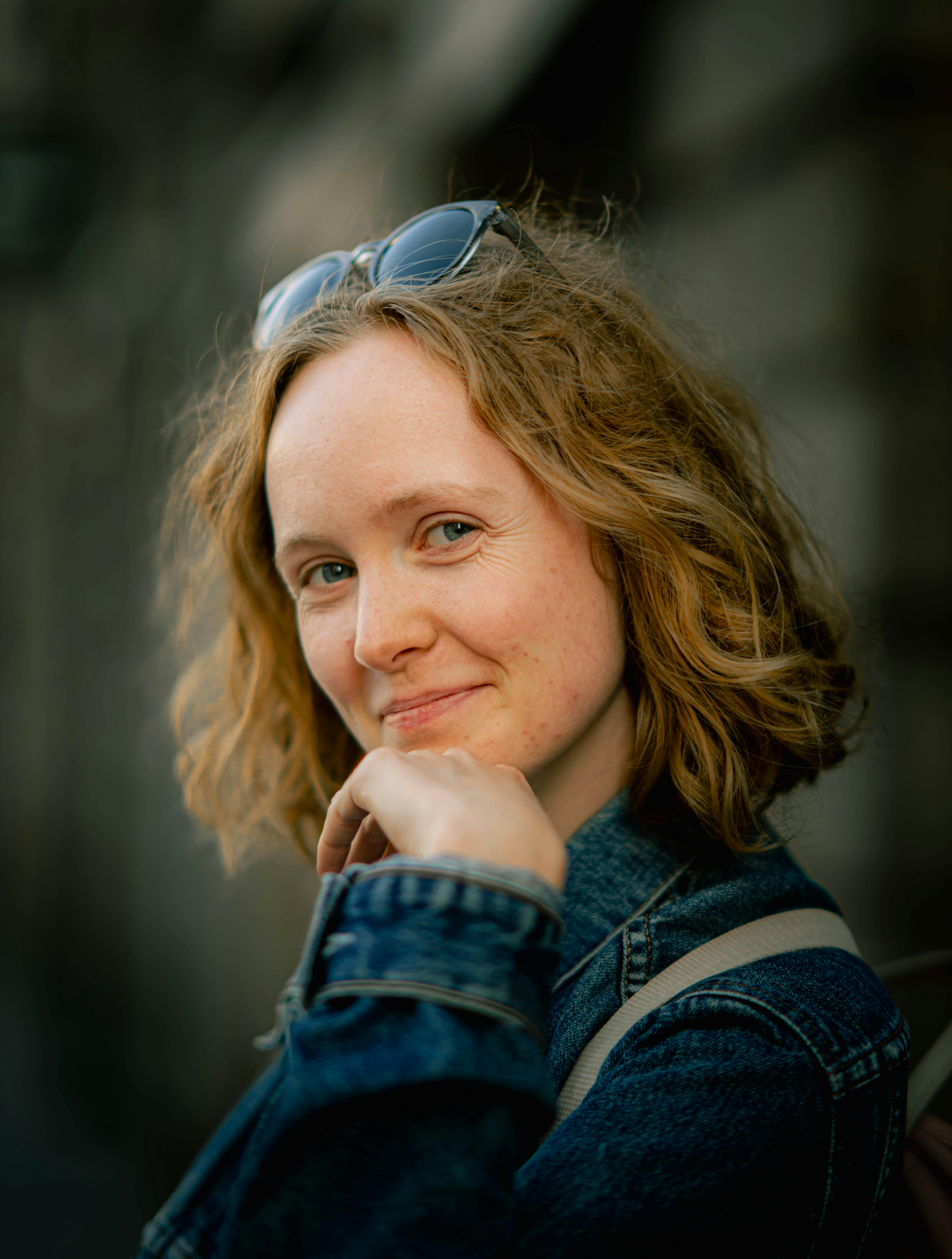 Photo of a Standing Woman Looking at Her Left · Free Stock Photo