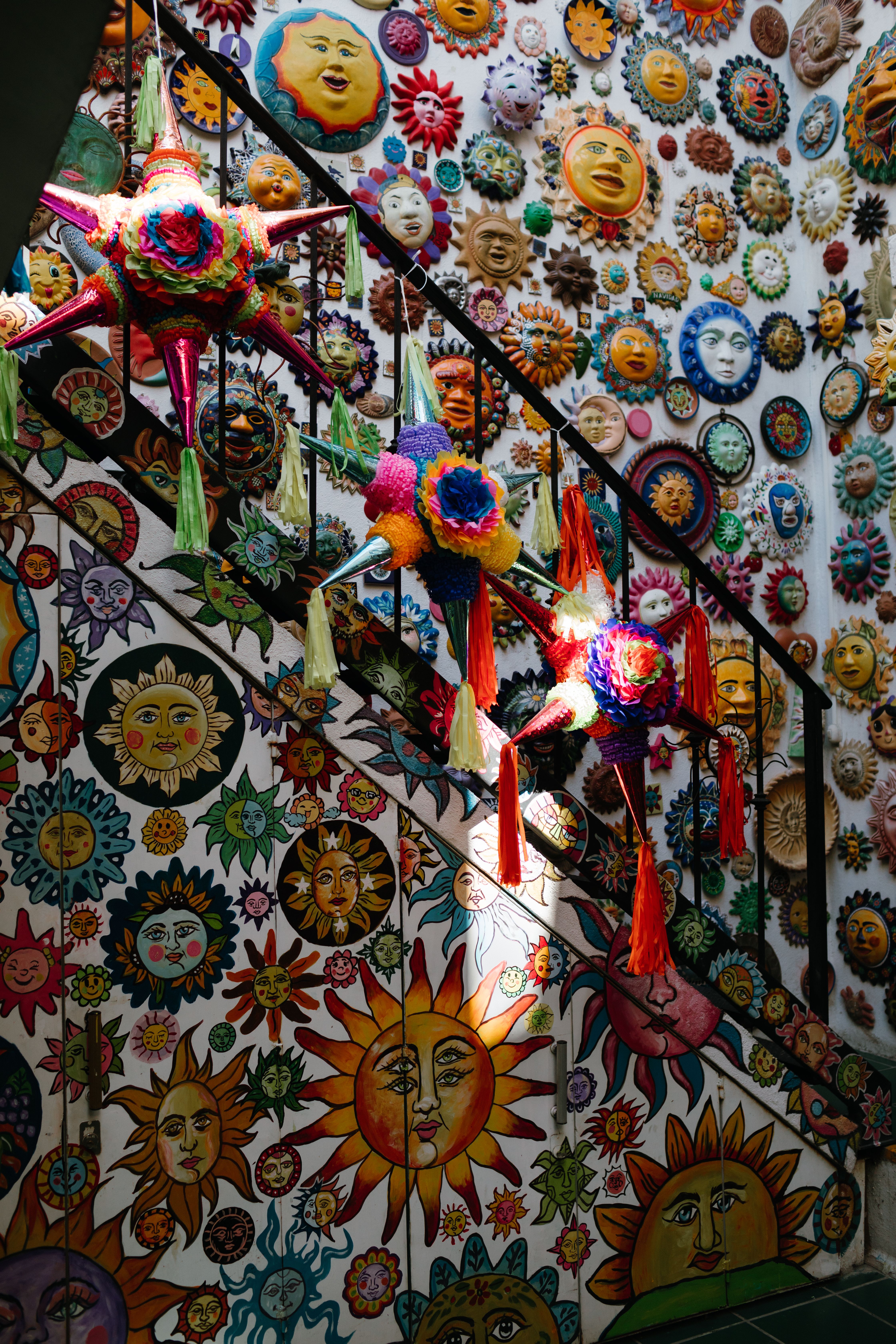Colorful Mexican Art Wall with Piñatas · Free Stock Photo