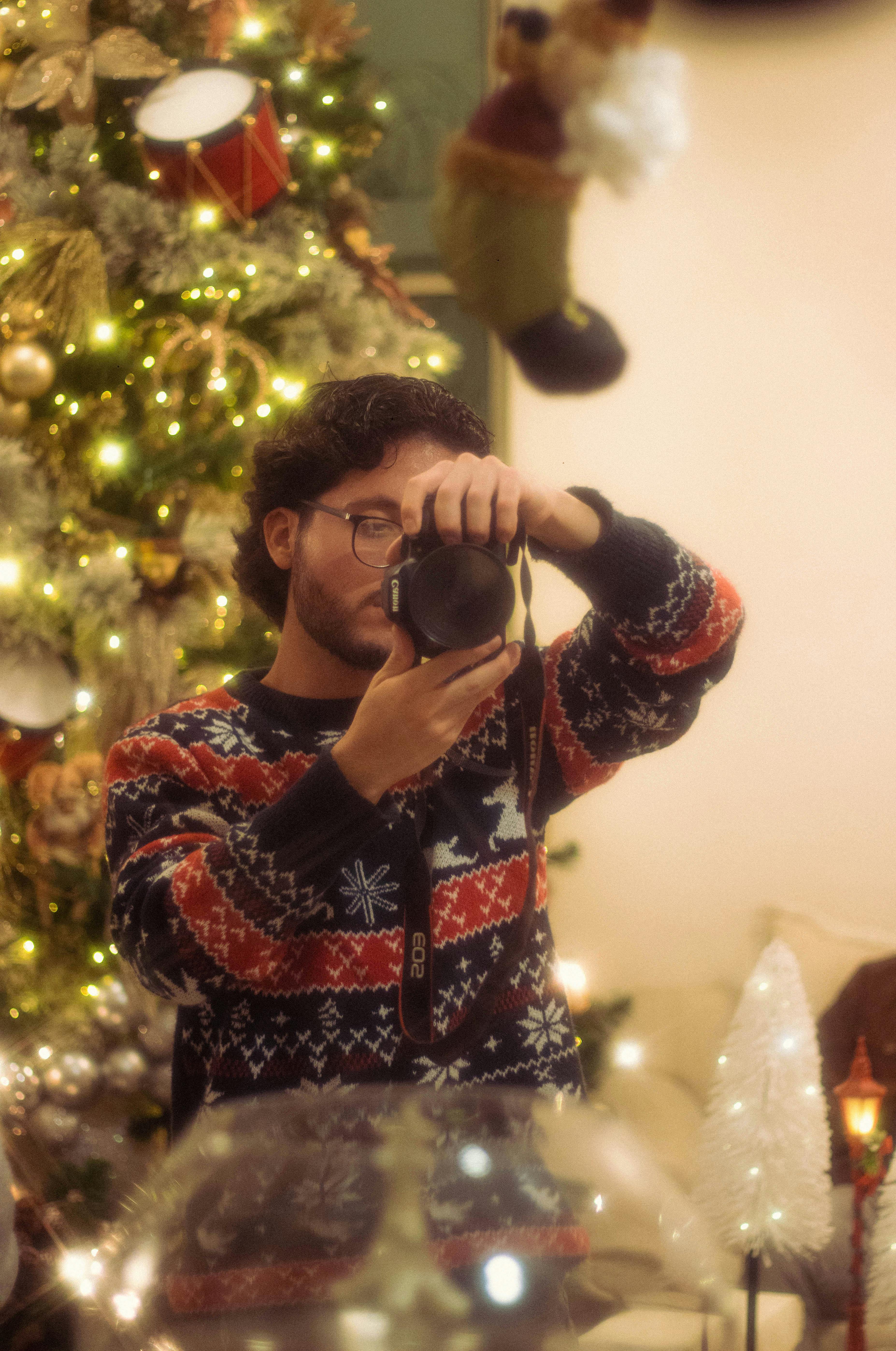 Festive Christmas Mirror Selfie with Ornaments · Free Stock Photo